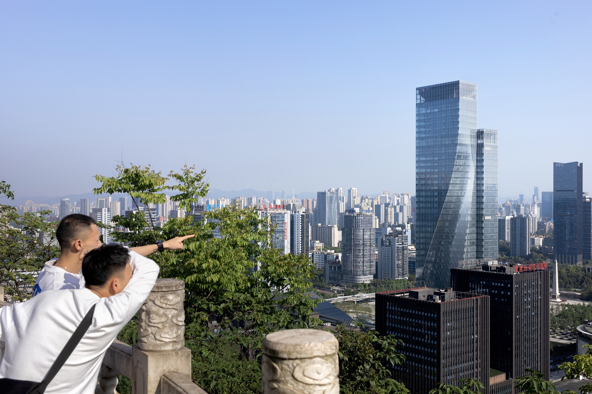 Aedas Completed World-class Twisting Tower in Chongqing, Glowing in ...