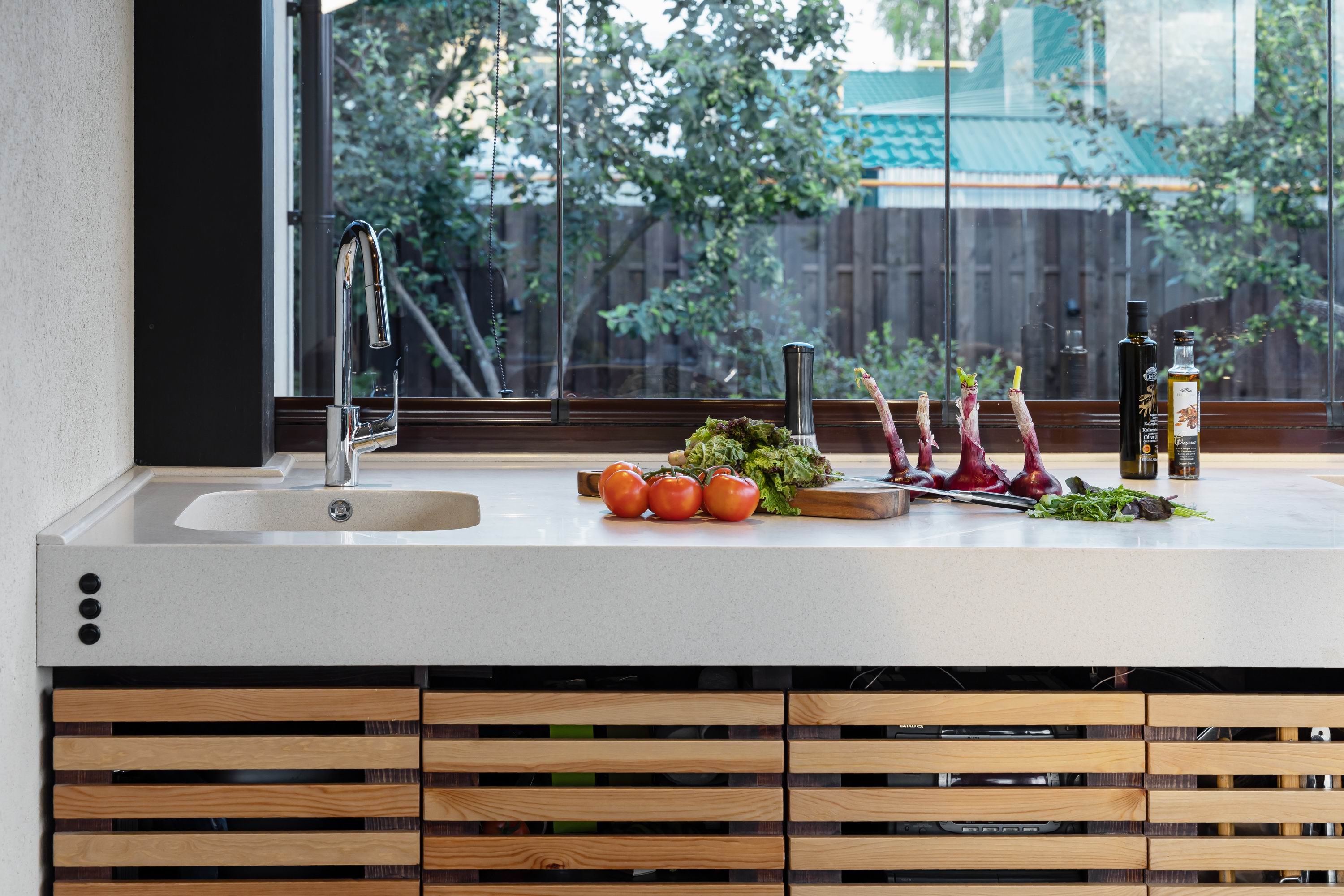 Terrace with swimming pool and summer kitchen in a country house by ...