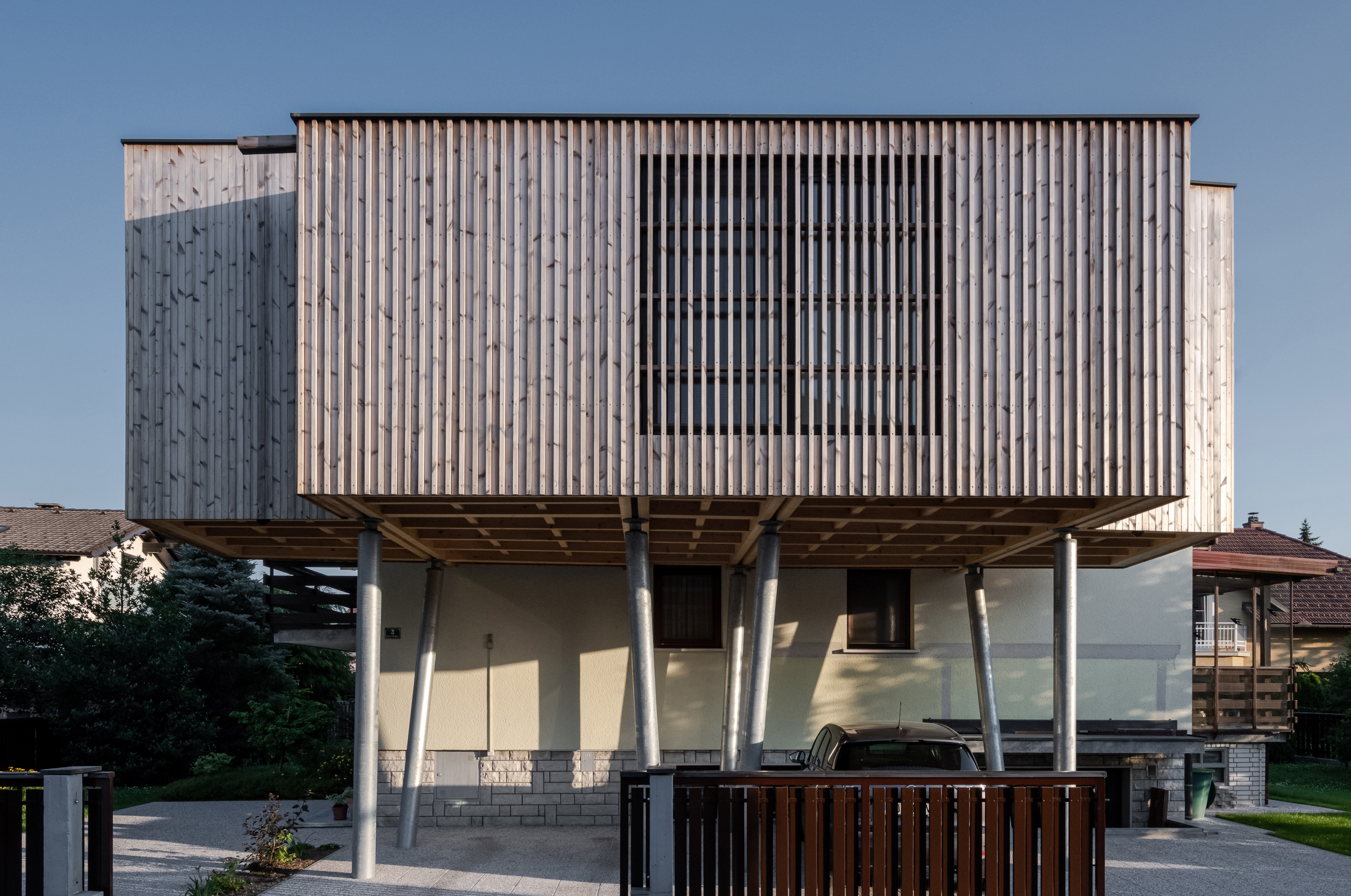 Wooden extension to an existing house by Atelje Ostan Pavlin - Architizer