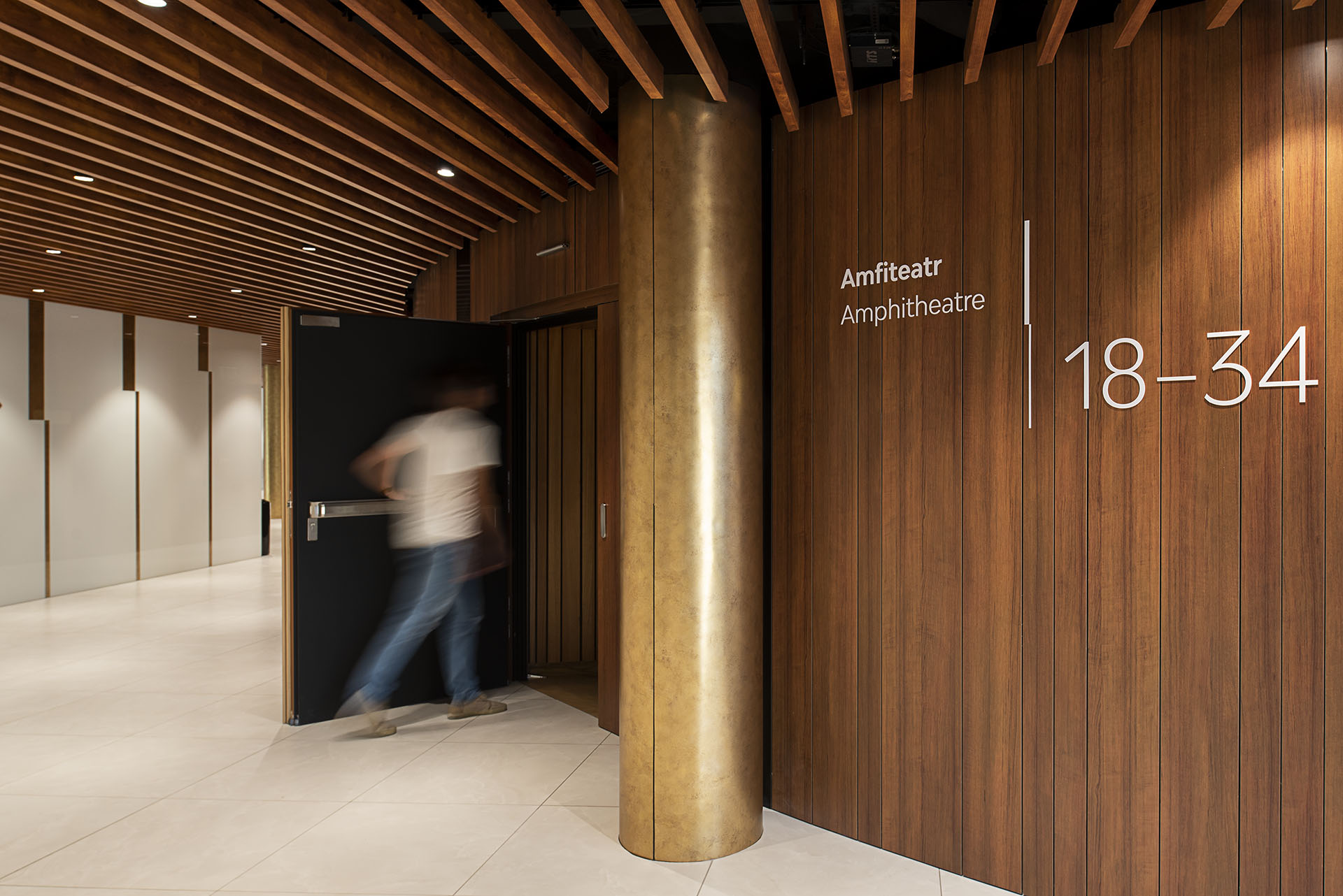 Wayfinding system for Włoskie Tarasy residential building in Warsaw by ...