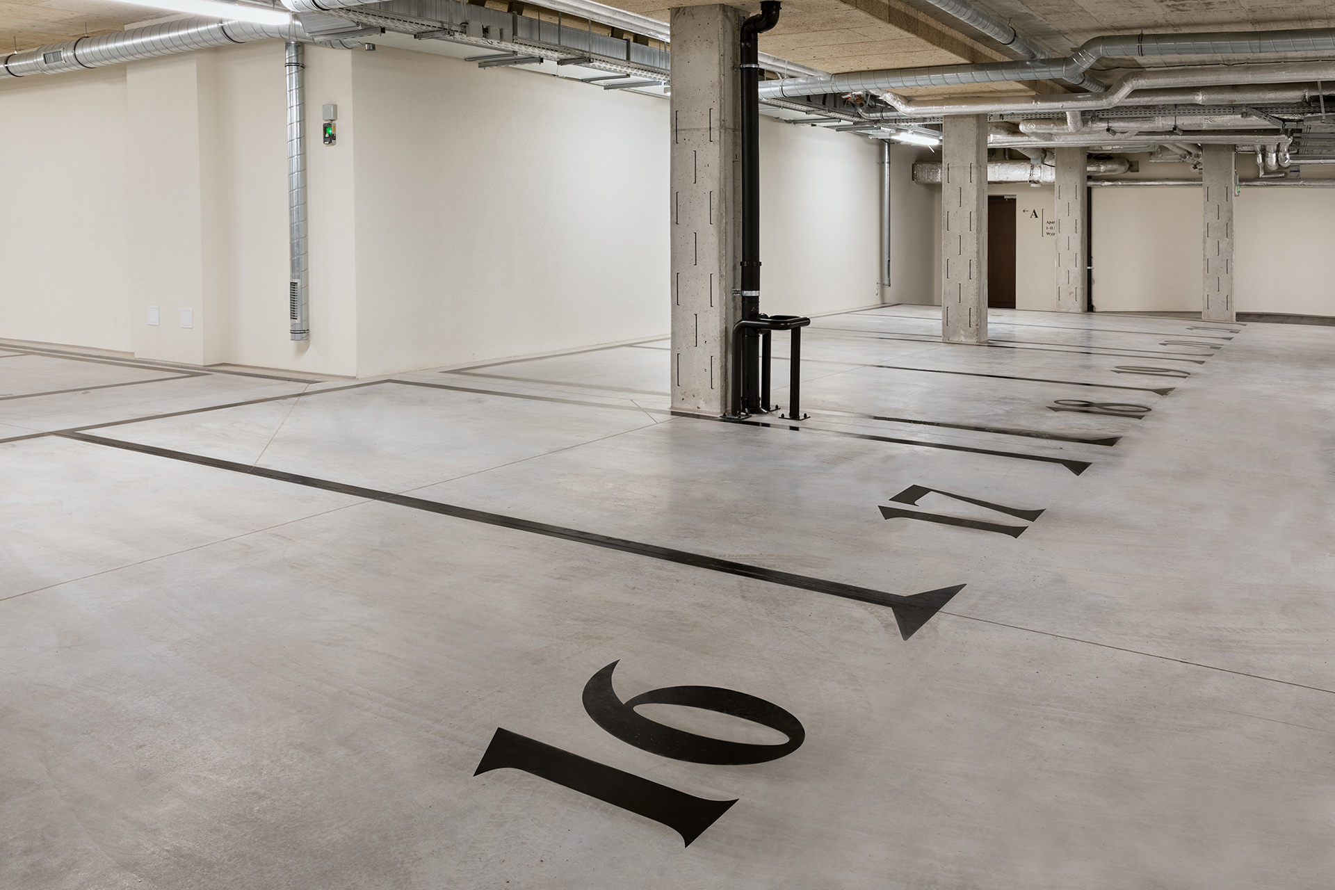 Wayfinding system in Wiszące Ogrody Apartment building by blank studio ...