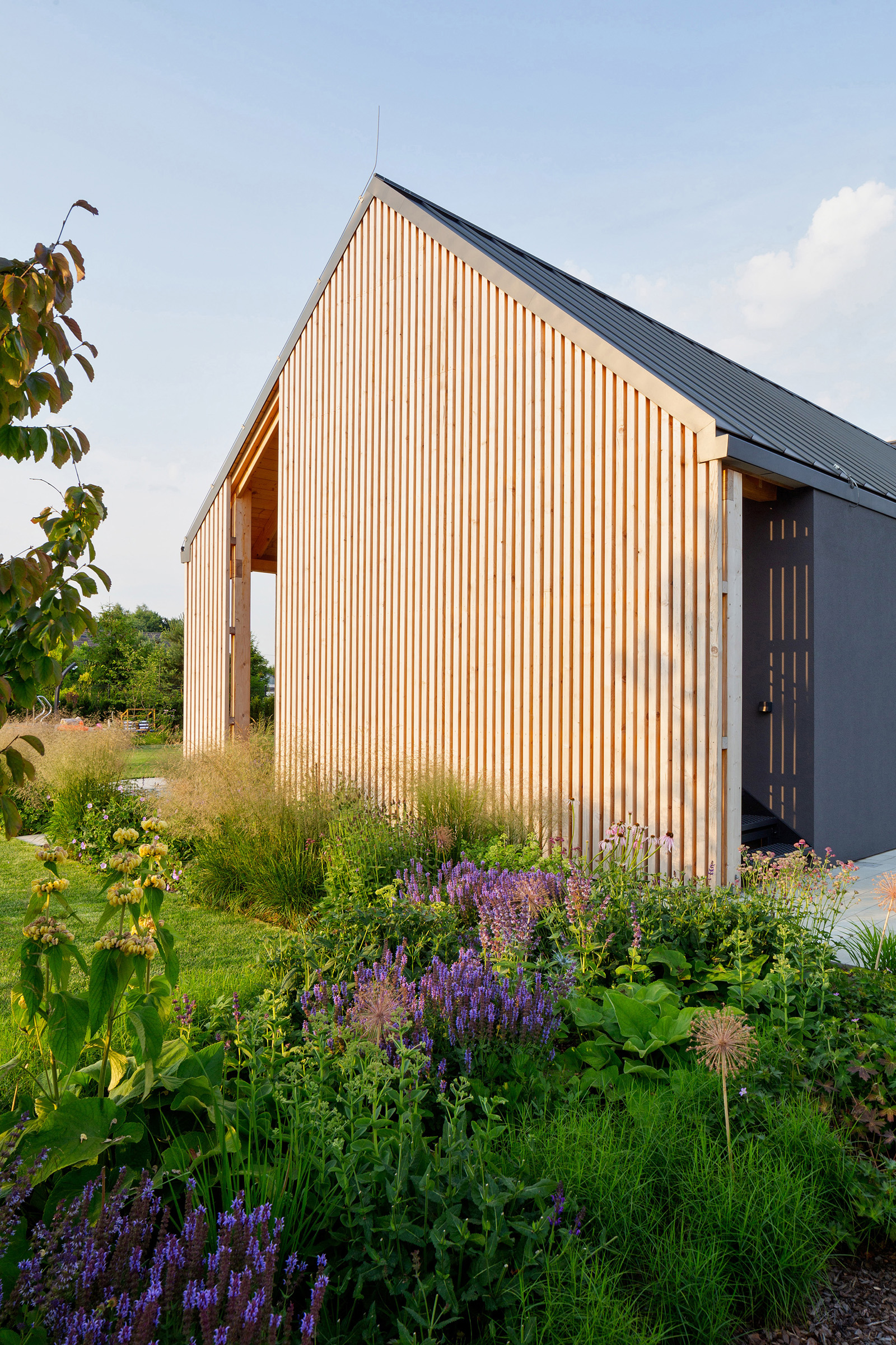 Gray house by RS+ Robert Skitek - Architizer