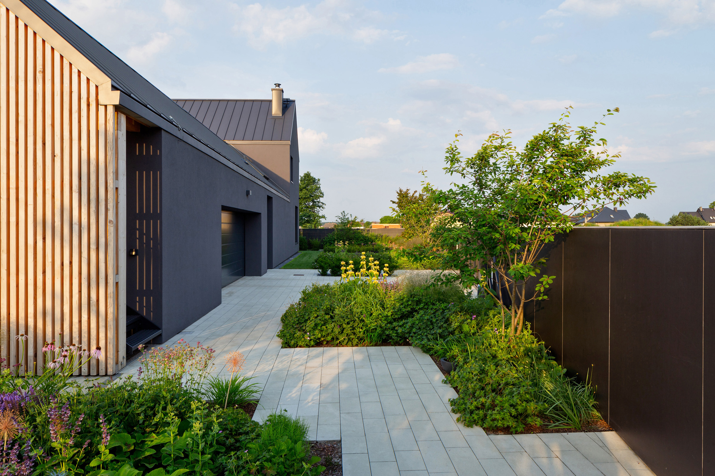 Gray house by RS+ Robert Skitek - Architizer