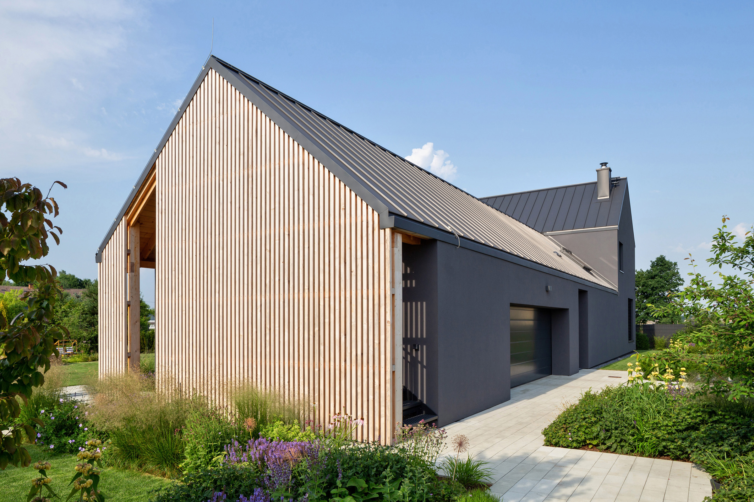 Gray house by RS+ Robert Skitek - Architizer