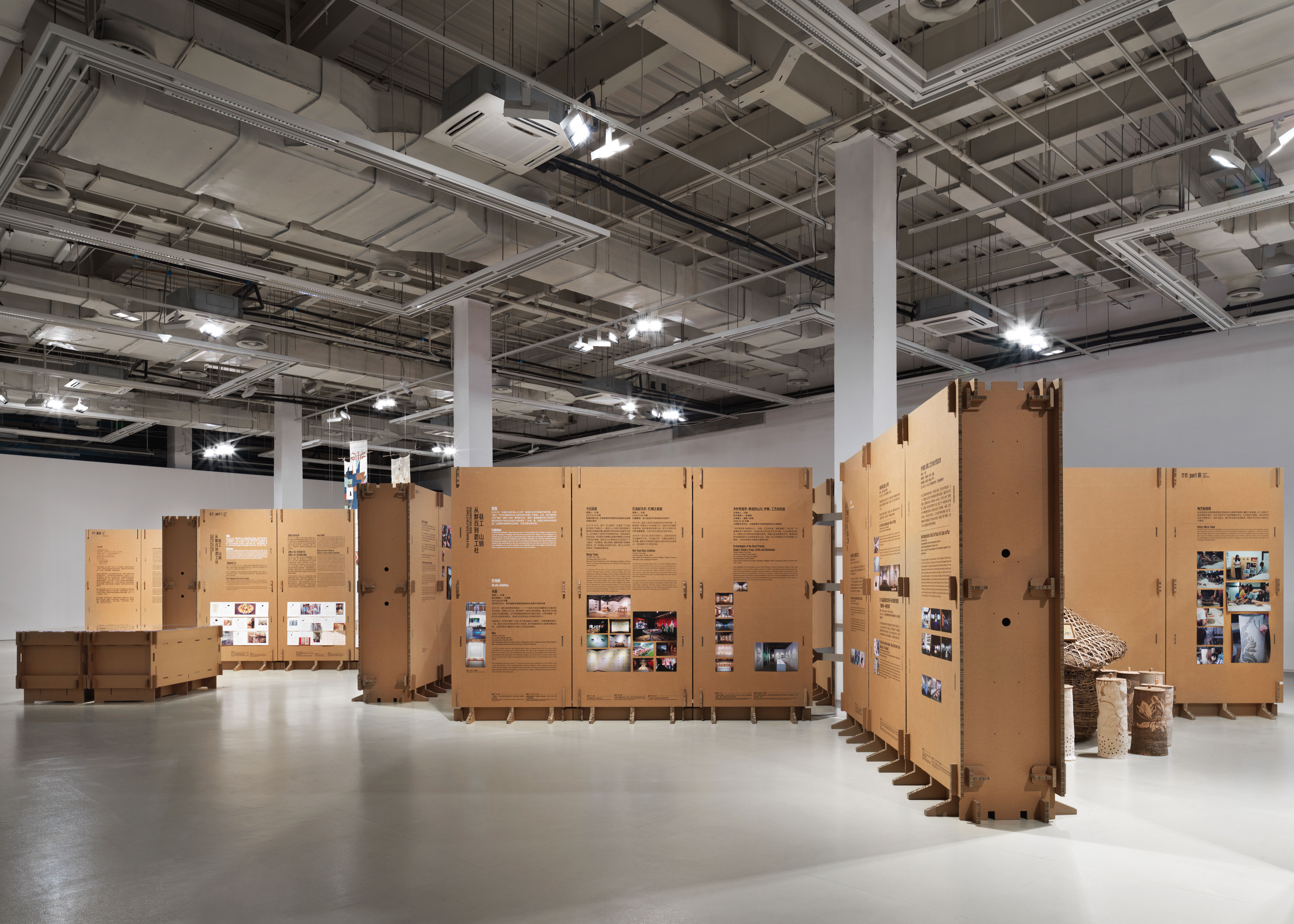 Corrugated Cardboard-Formed Exhibition Space by LUO studio - Architizer