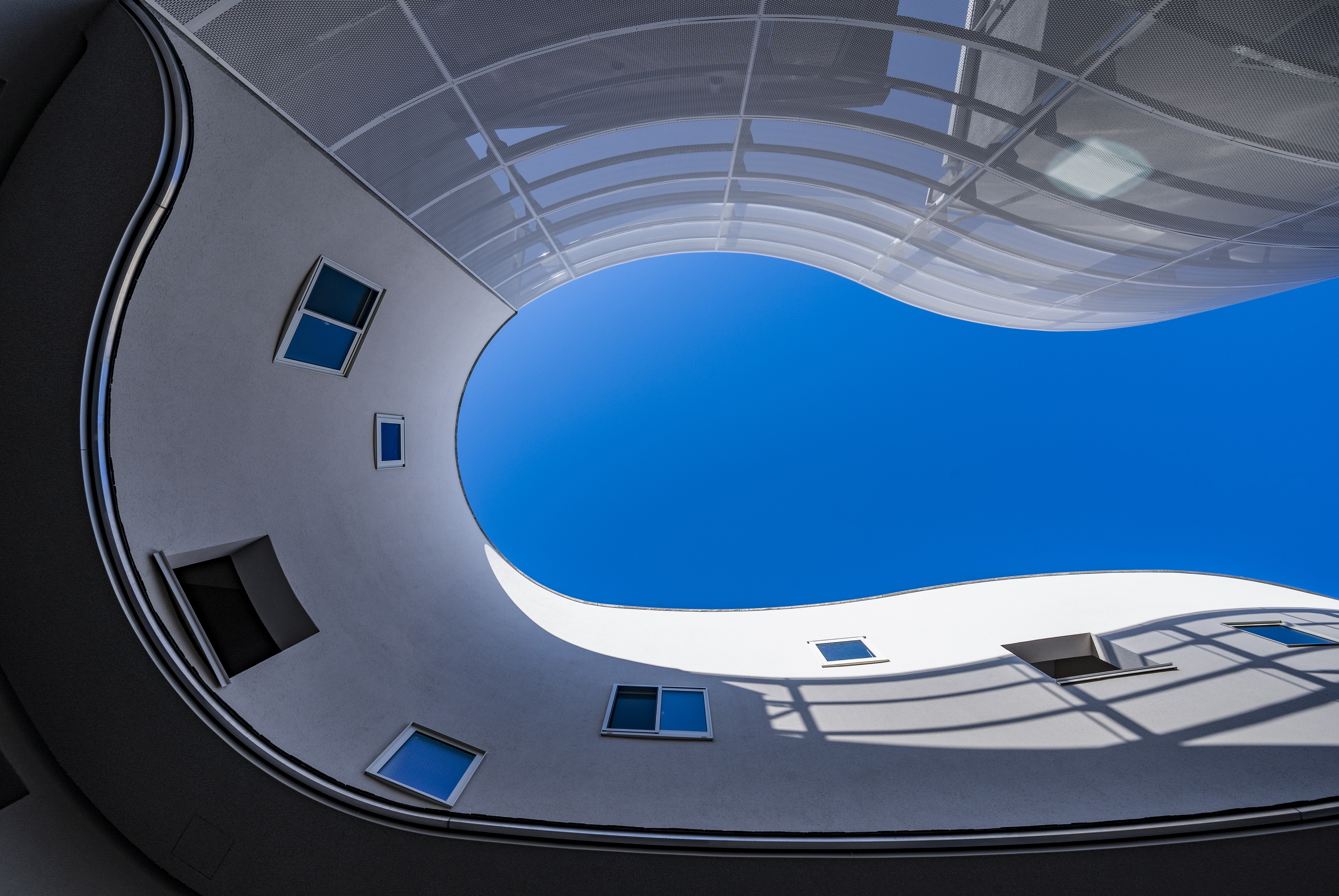 Kubomi Apartments -A Pocket in the City by Organic Design Inc. - Architizer