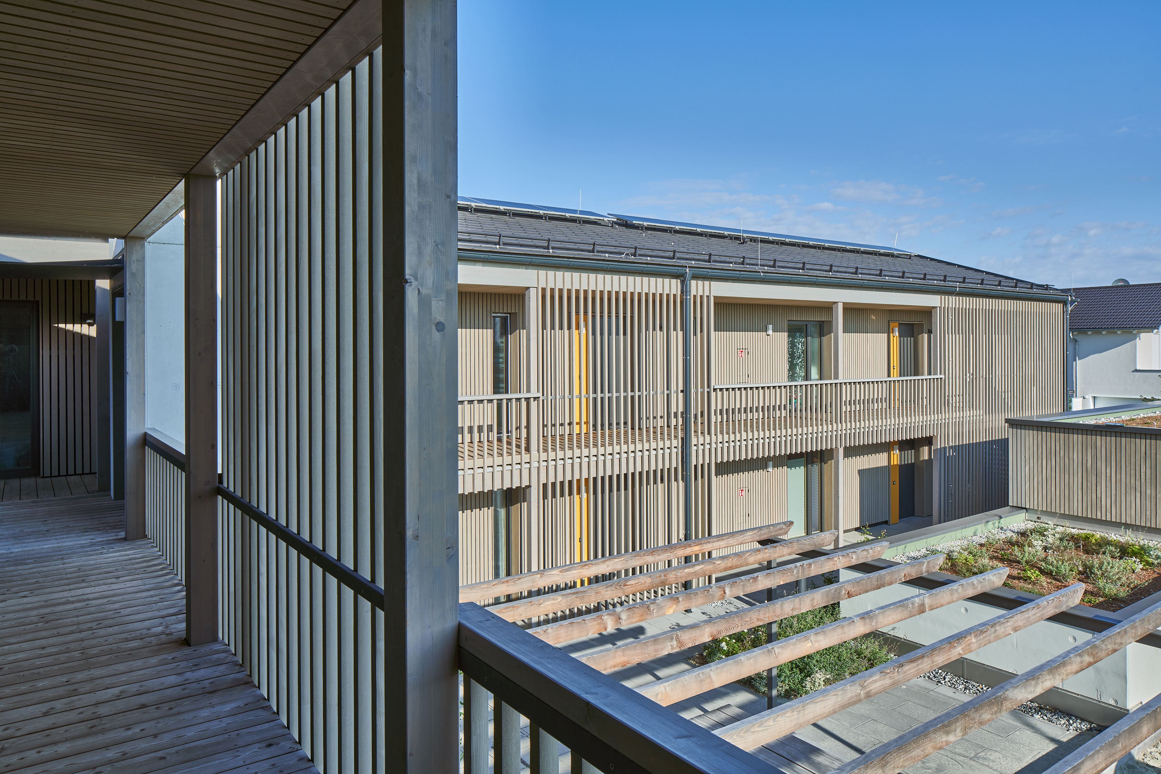 multi-family apartment building in timber construction by HOE ...