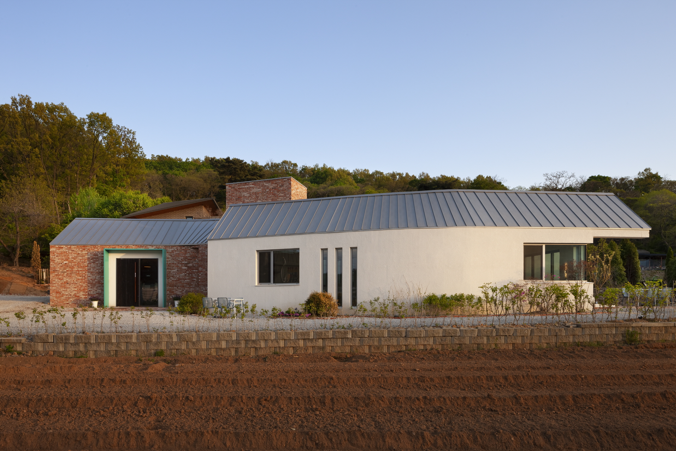 The House With Four Wings by Studio Gaon - Architizer