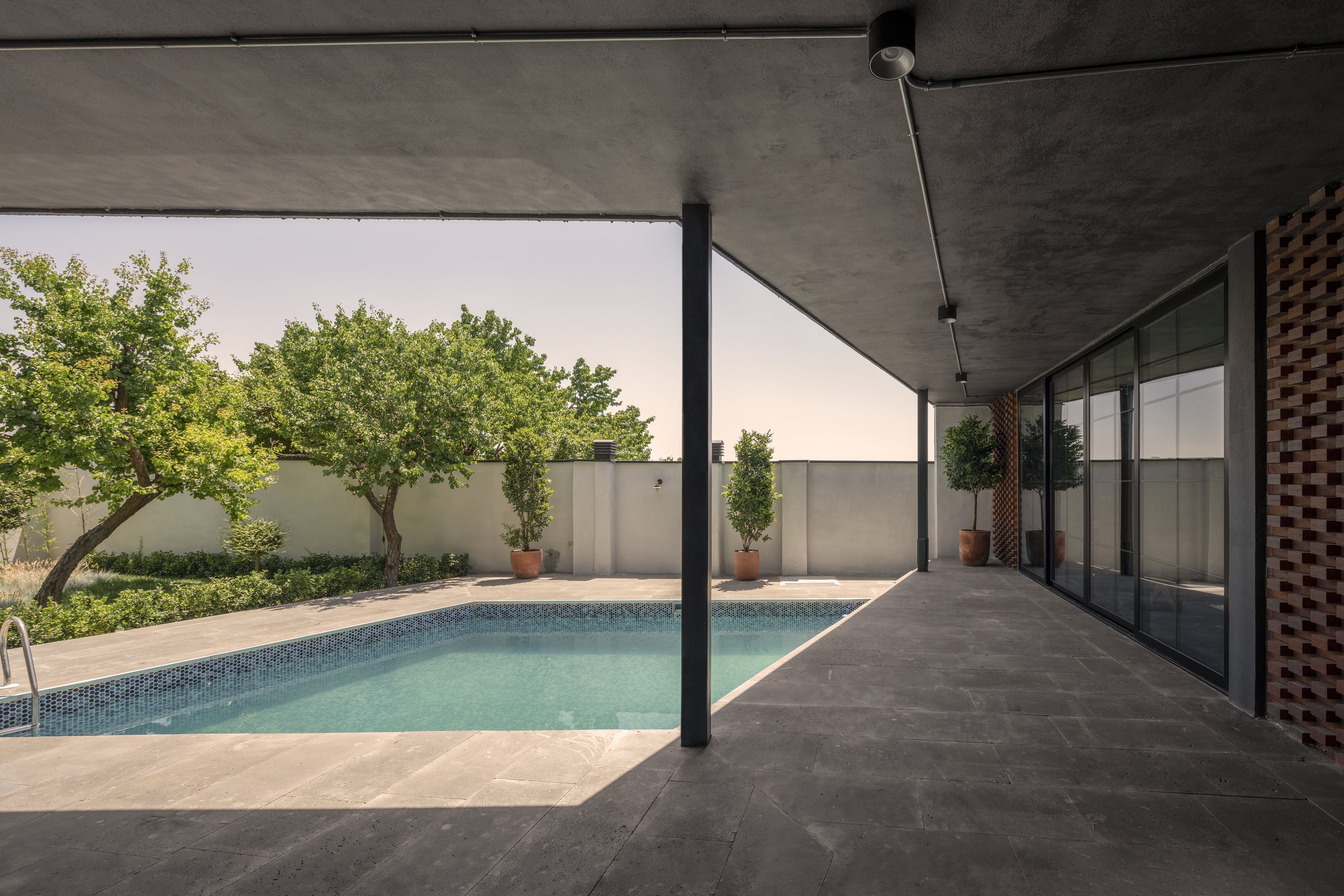 Corner Villa by Arash Madani Design Studio - Architizer