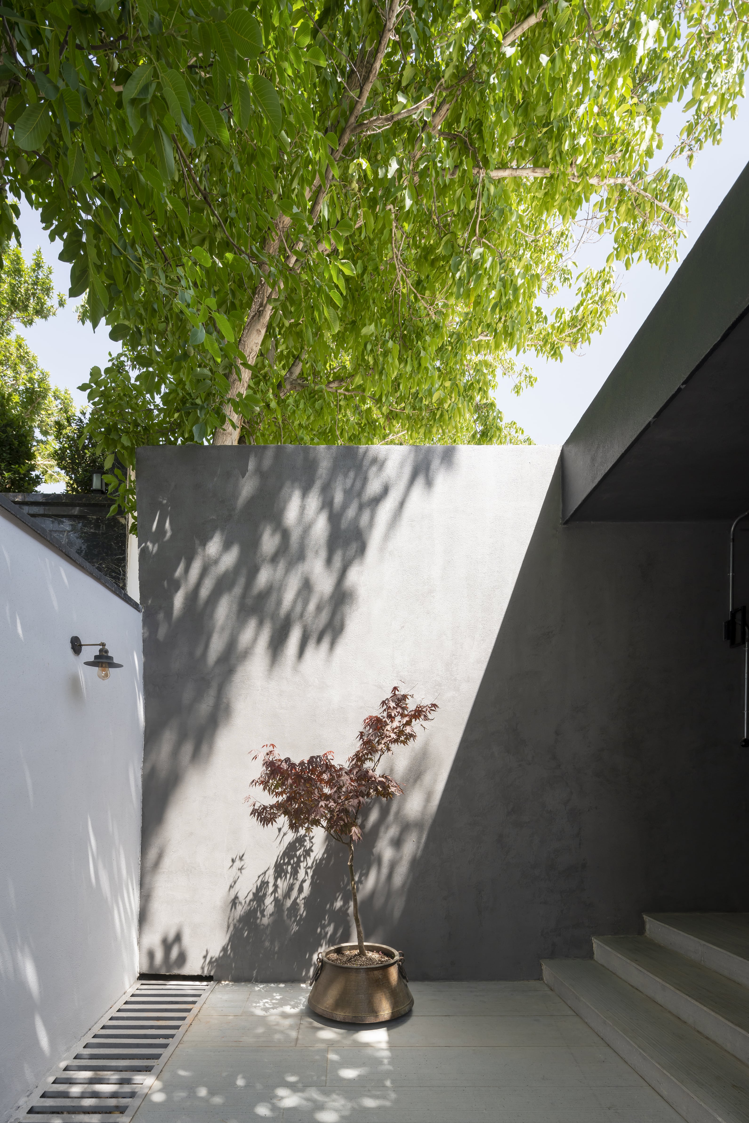 Corner Villa by Arash Madani Design Studio - Architizer