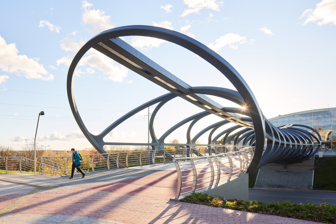 Pedestrian bridge in Jonava by Architekturos linija - Architizer