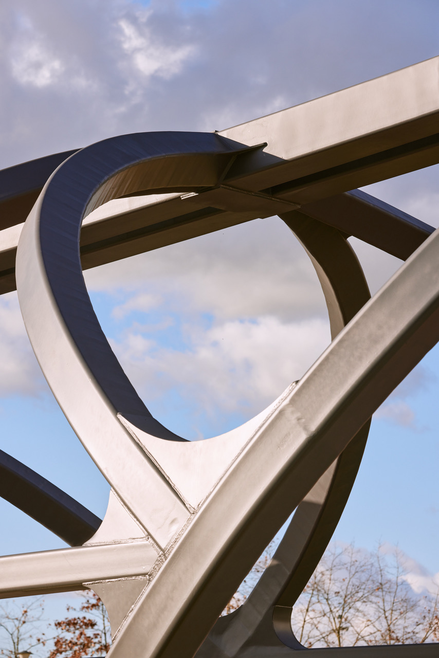 Pedestrian bridge in Jonava by Architekturos linija - Architizer