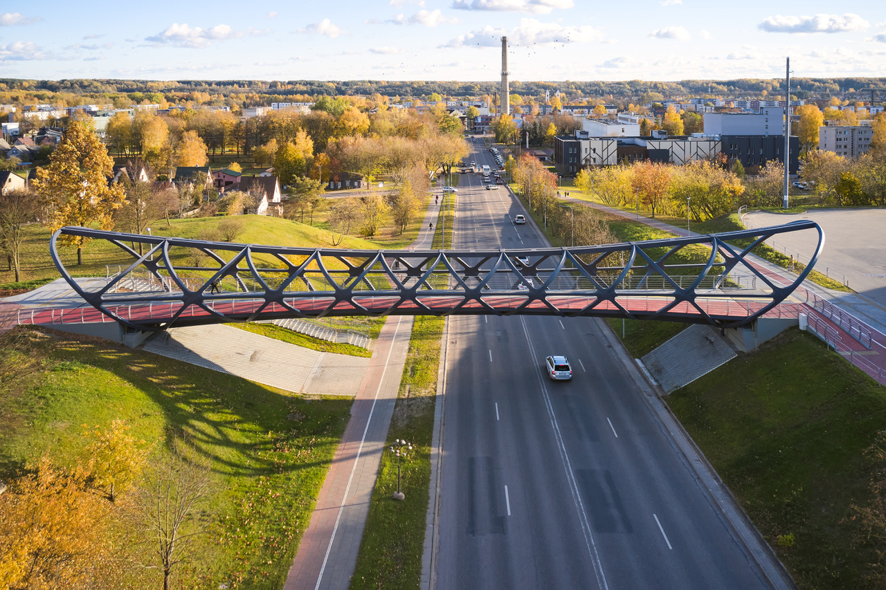 Pedestrian bridge in Jonava by Architekturos linija - Architizer