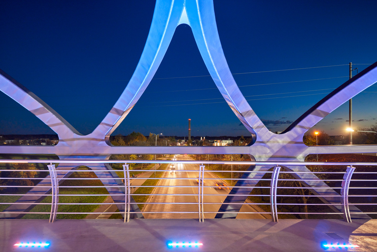 Pedestrian bridge in Jonava by Architekturos linija - Architizer