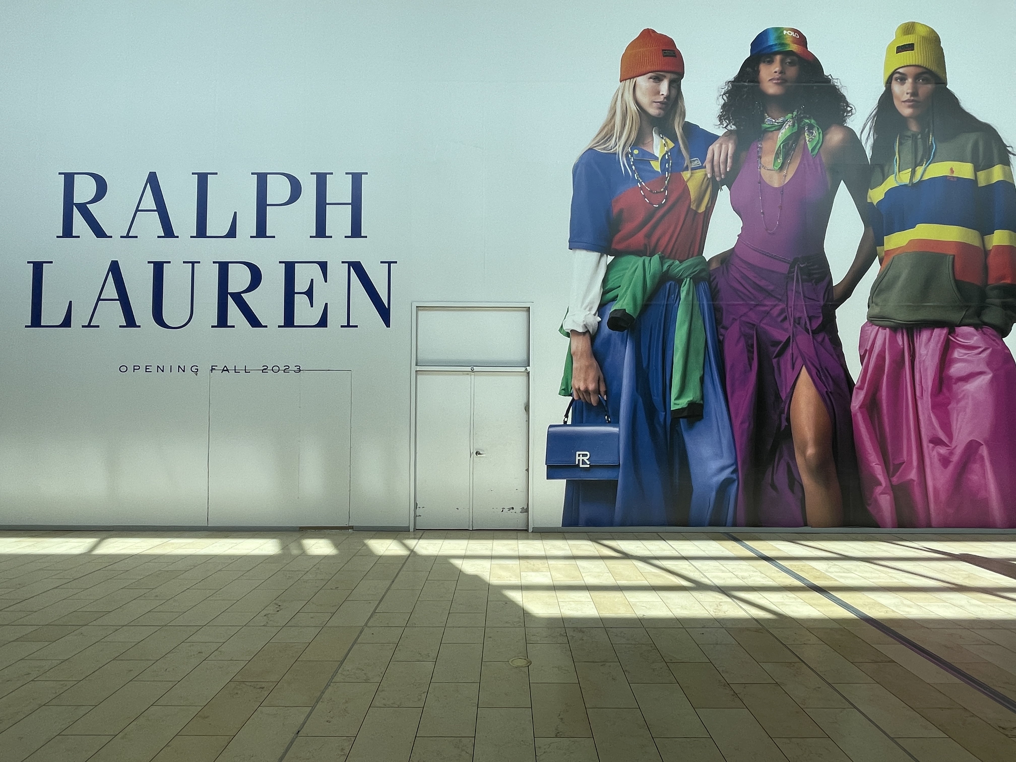 Cherry Wood Louvers and Aged-Bronze Storefront by Nicholas Jay ...