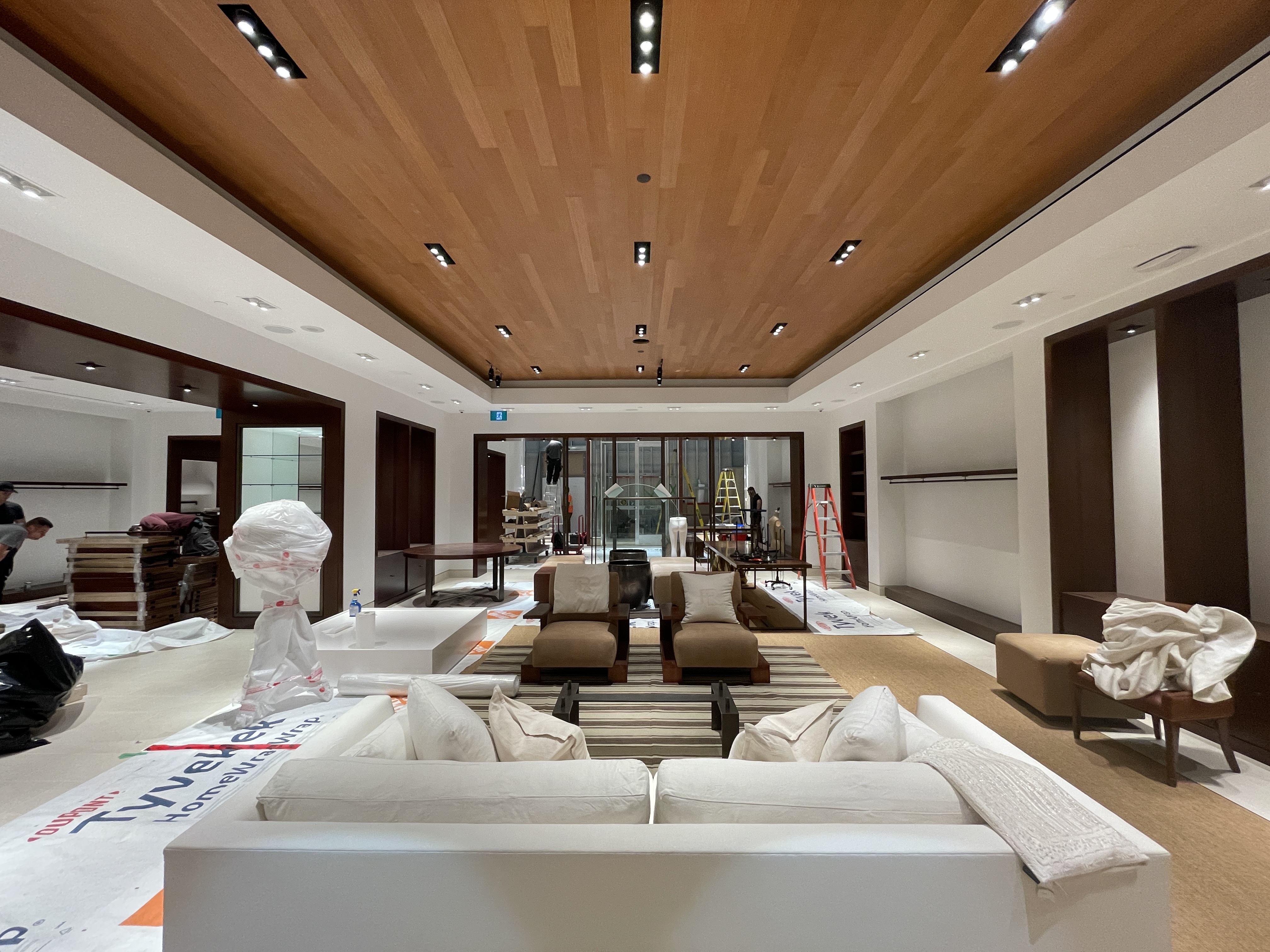 Cherry Wood Louvers and Aged-Bronze Storefront by Nicholas Jay ...