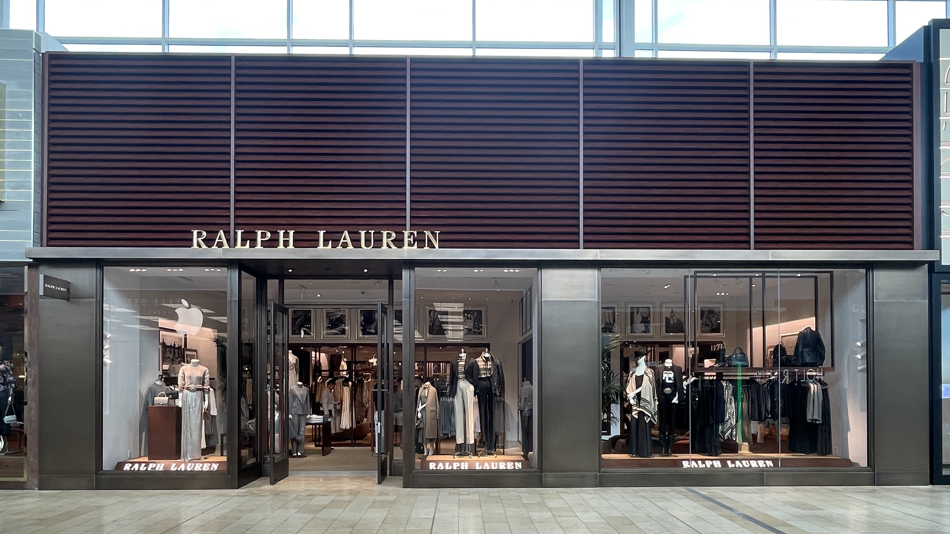 Cherry Wood Louvers and Aged-Bronze Storefront by Nicholas Jay ...
