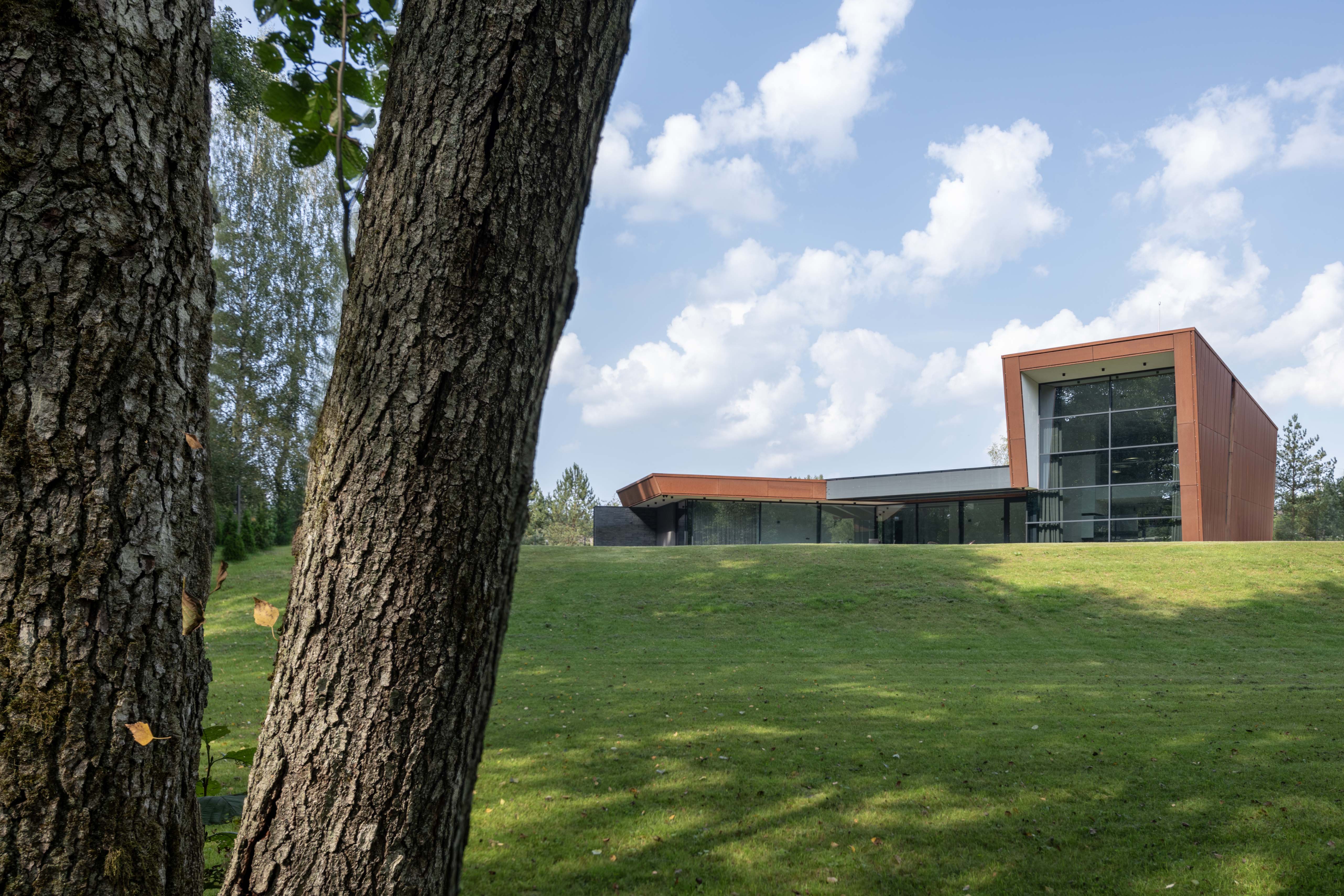 River side rusty house by Architecture laboratory ArchLAB - Architizer