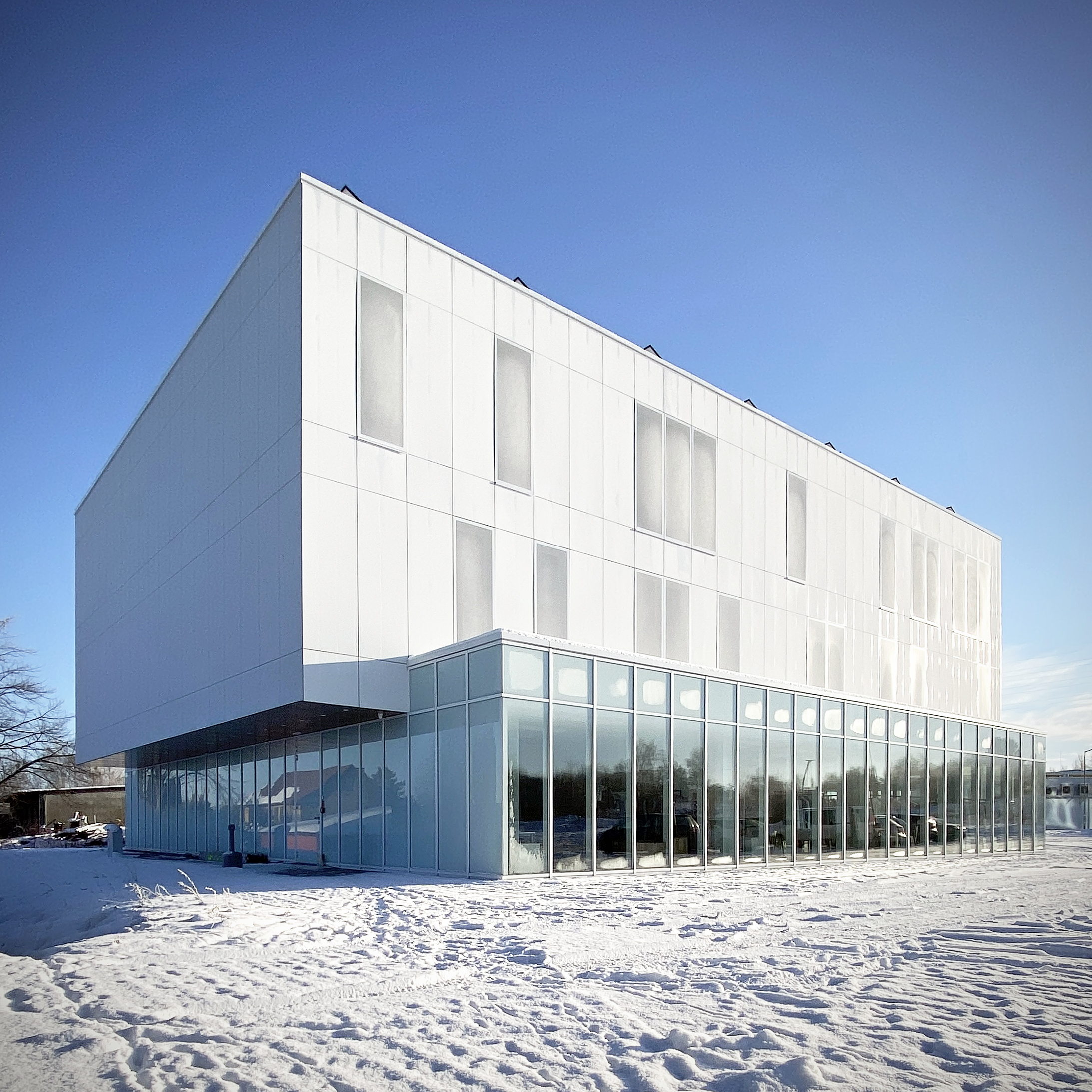 White office building by ANIEA - Architizer