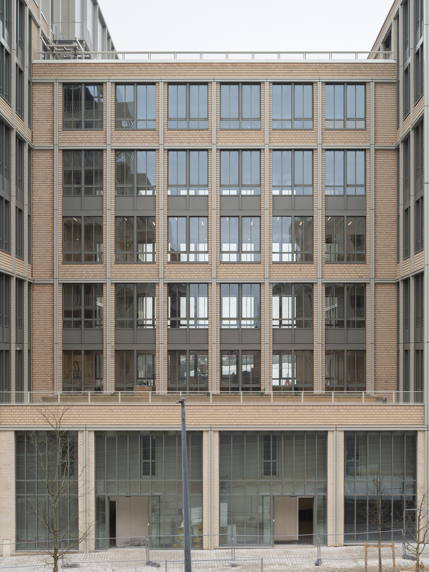 MIXED BUILDING ATHLETES VILLAGE by DREAM - Architizer