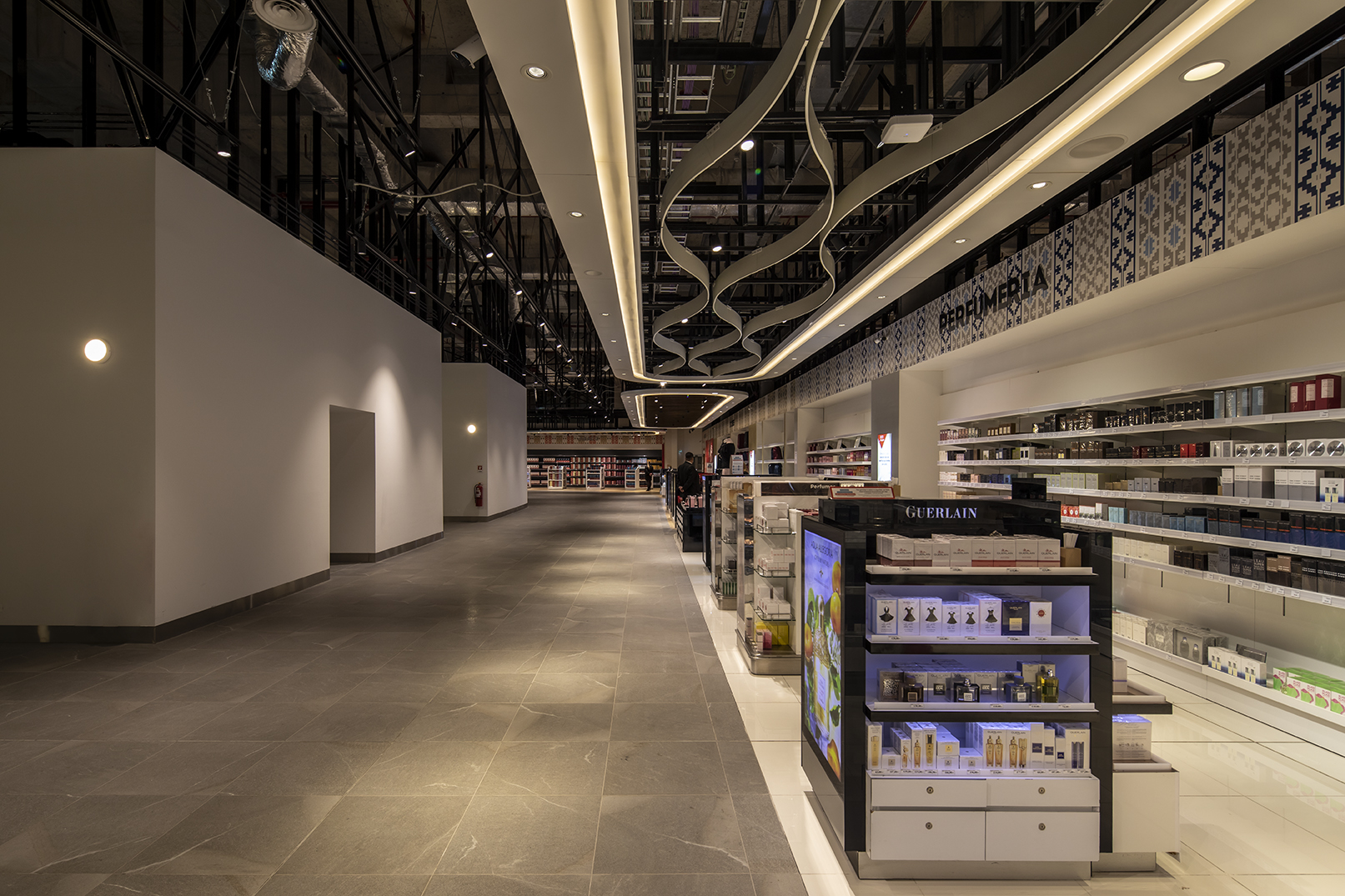 DUFRY DUTY FREE STORE Arrivals T2 by Grupo Arquitectos - Architizer
