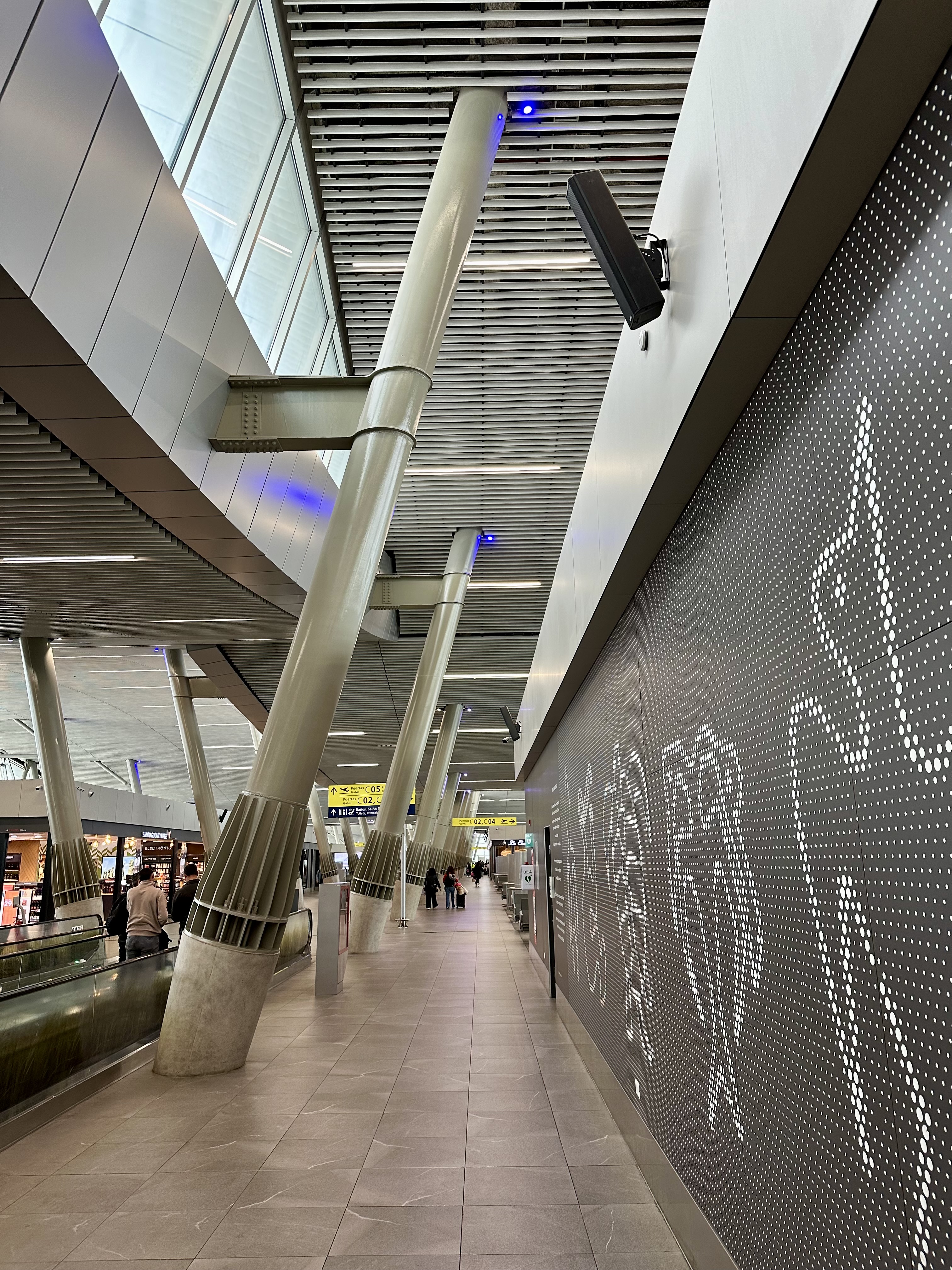 AMB International Airport Interior Design by Grupo Arquitectos - Architizer