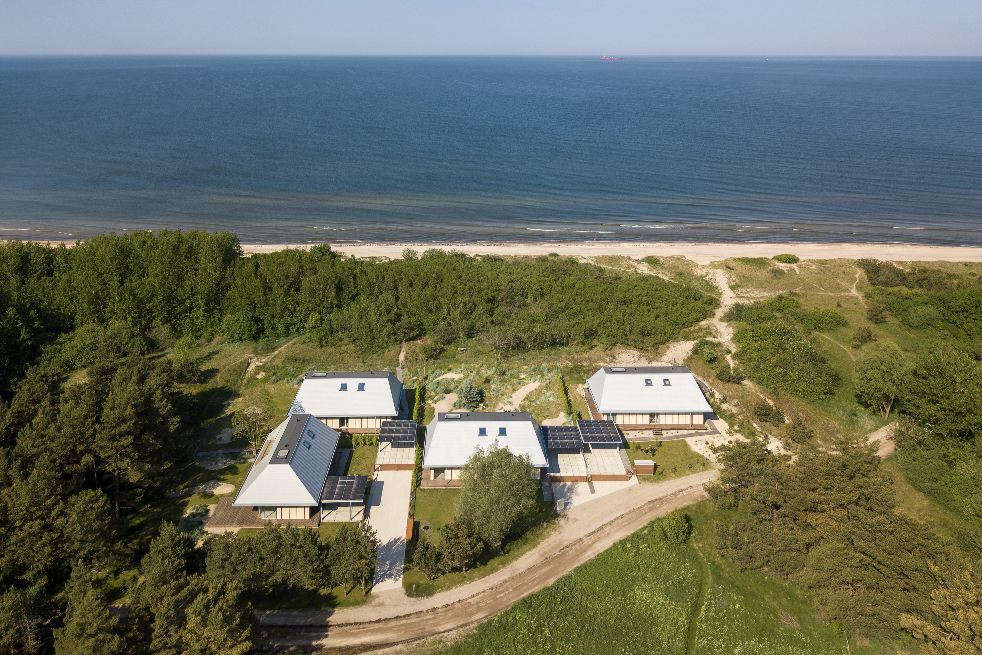 Curonians Houses by Devyni Architektai - Architizer