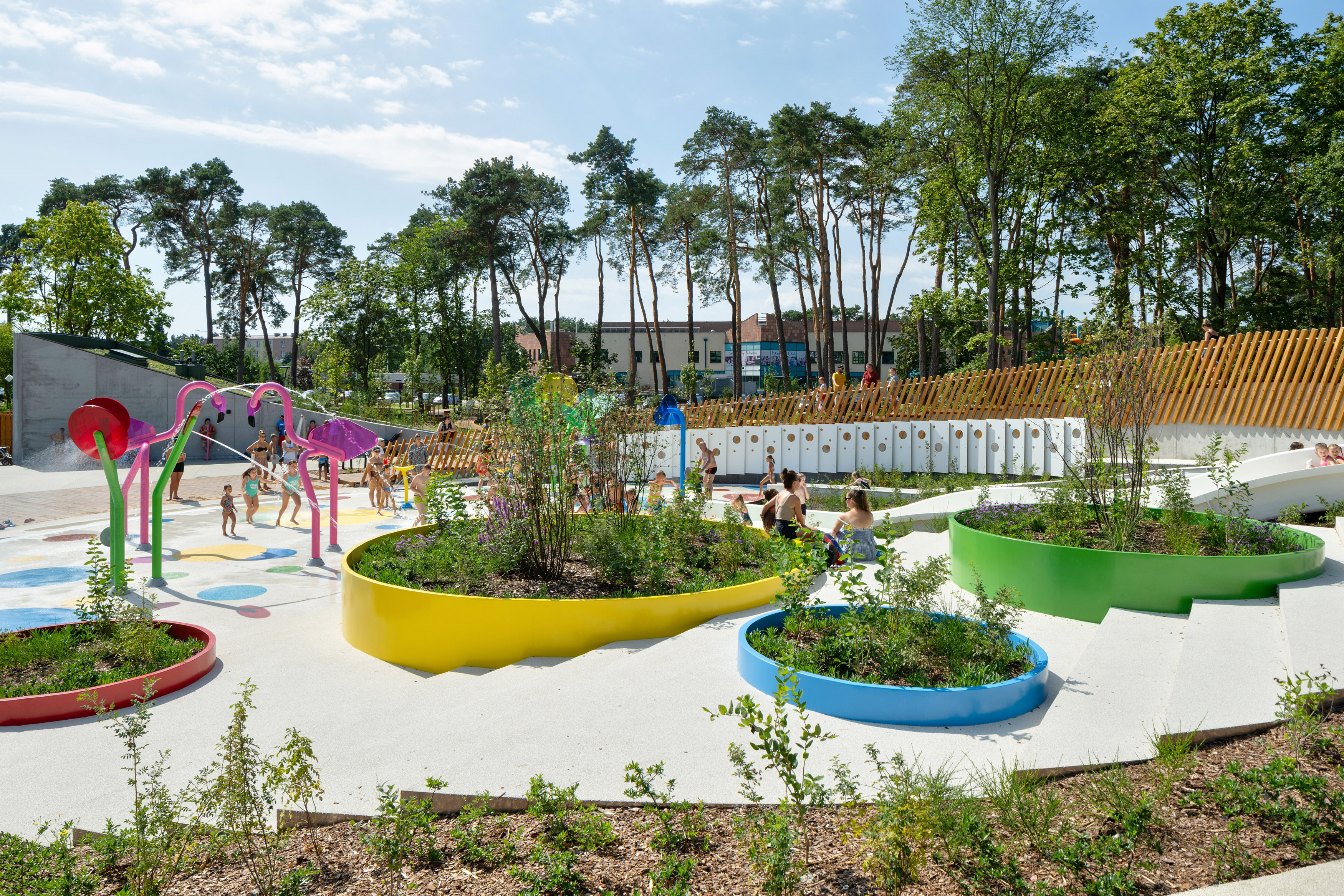 Recreation and sports park with water playgrounds by RS+ Robert Skitek ...