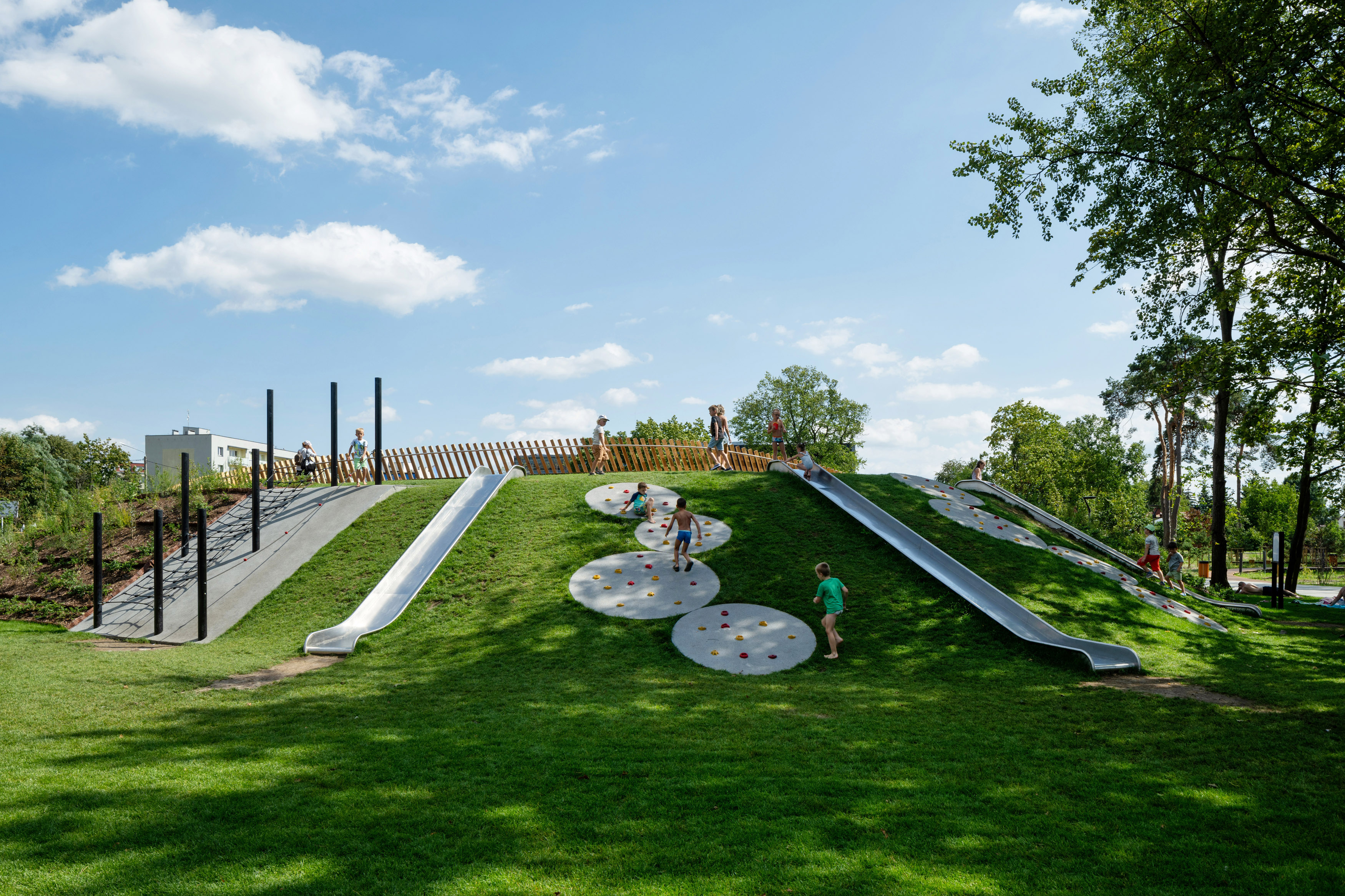 Recreation and sports park with water playgrounds by RS+ Robert Skitek ...