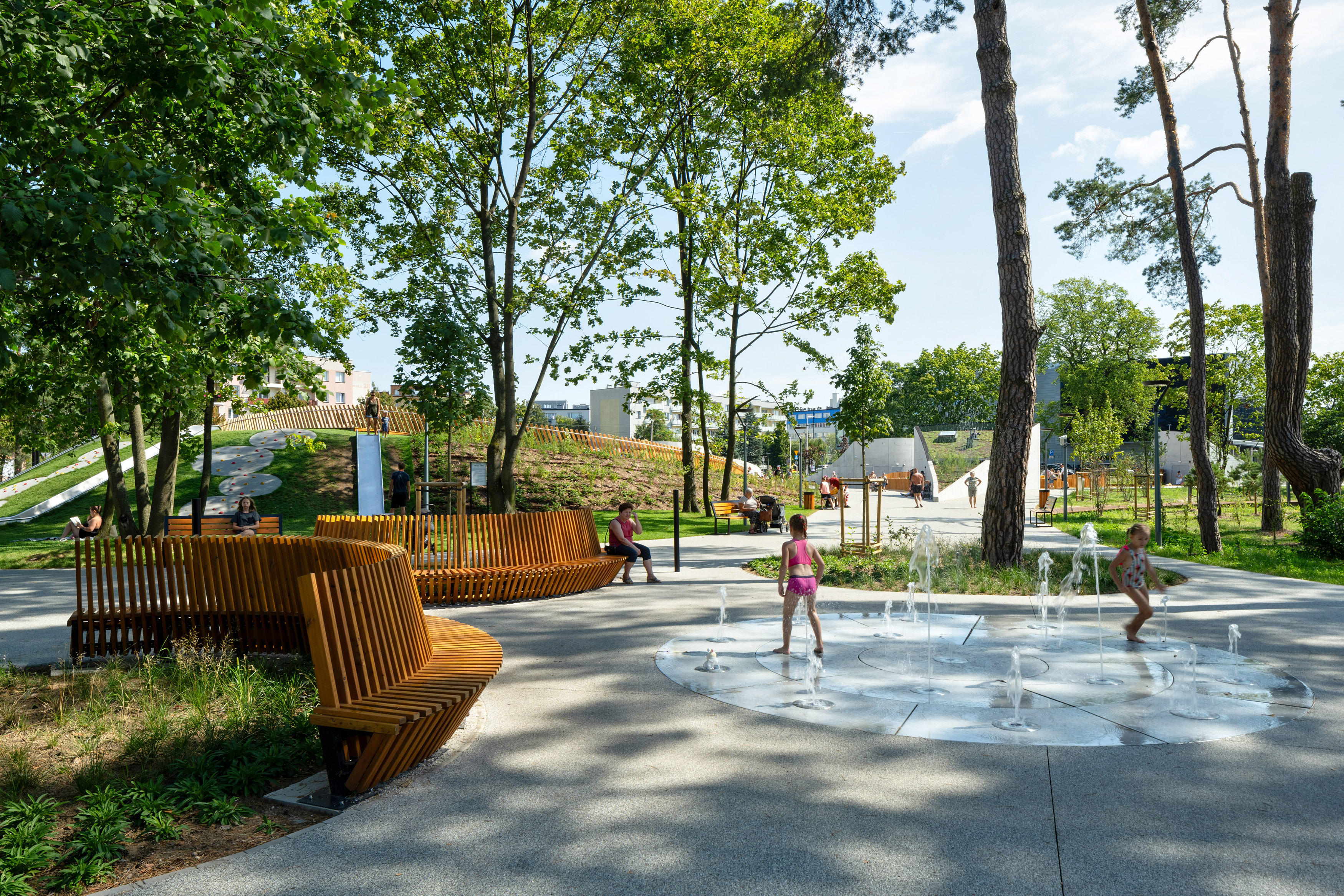 Recreation and sports park with water playgrounds by RS+ Robert Skitek ...