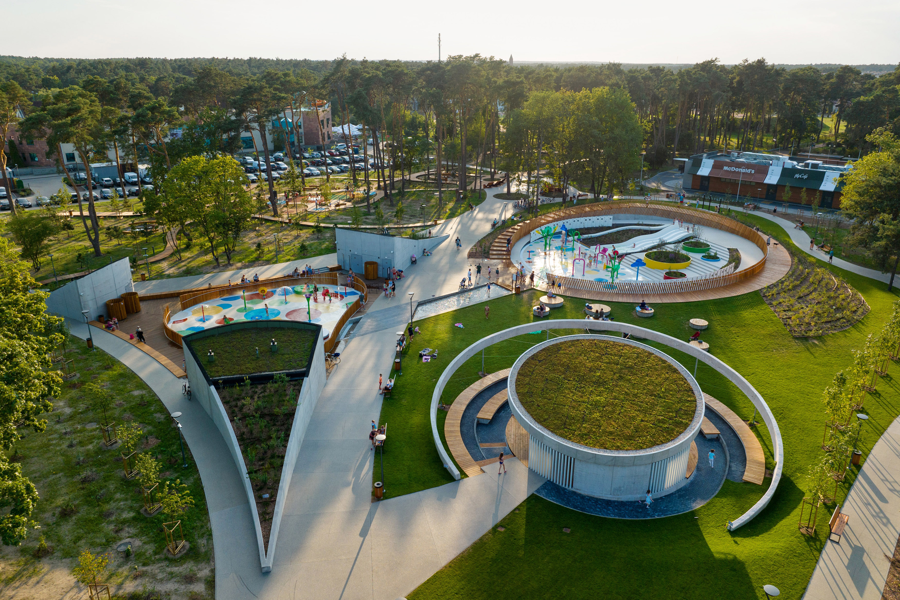 Recreation and sports park with water playgrounds by RS+ Robert Skitek ...