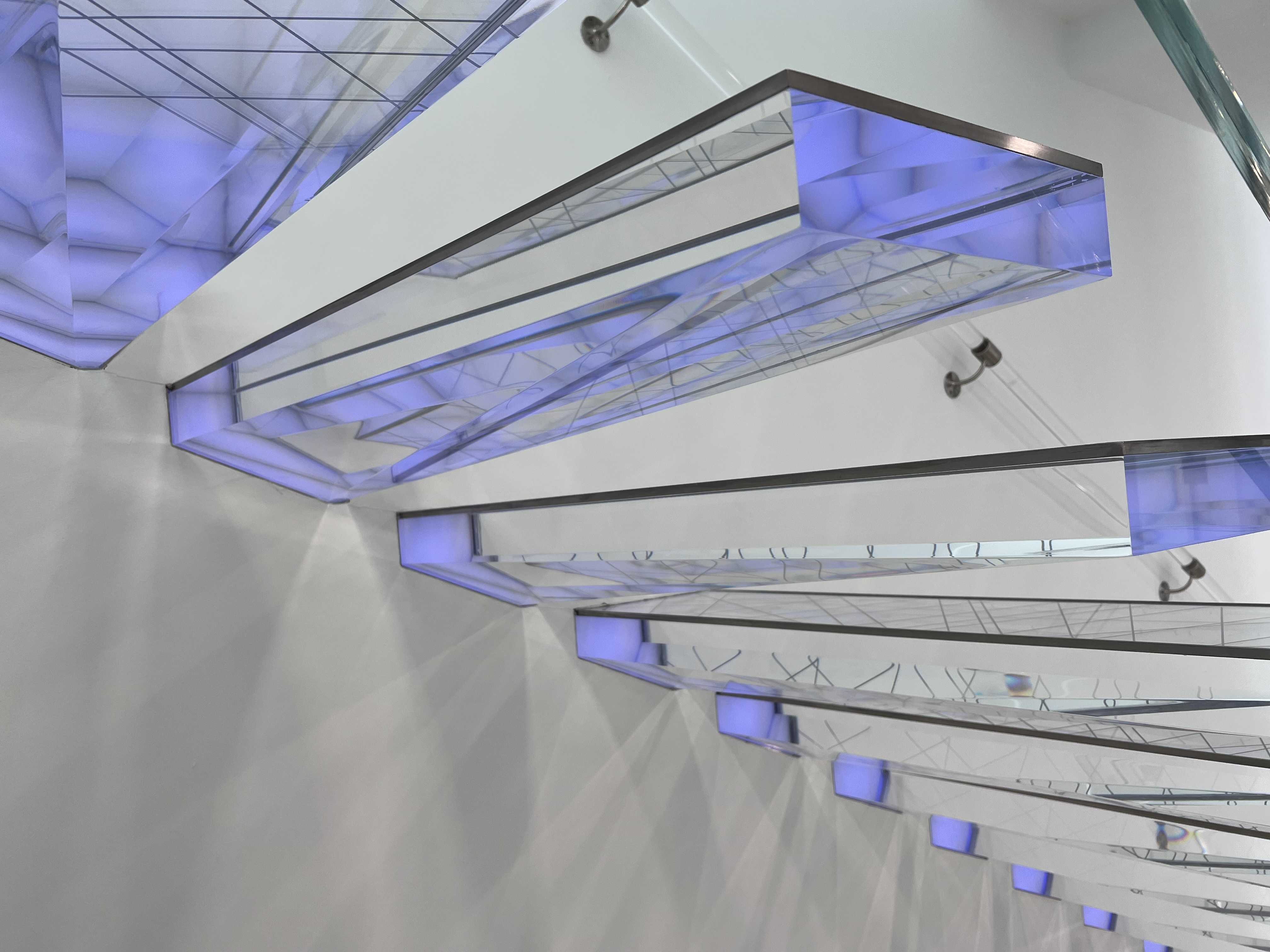 Acrylic staircase with glass and LED elements by Siller Stairs - Architizer