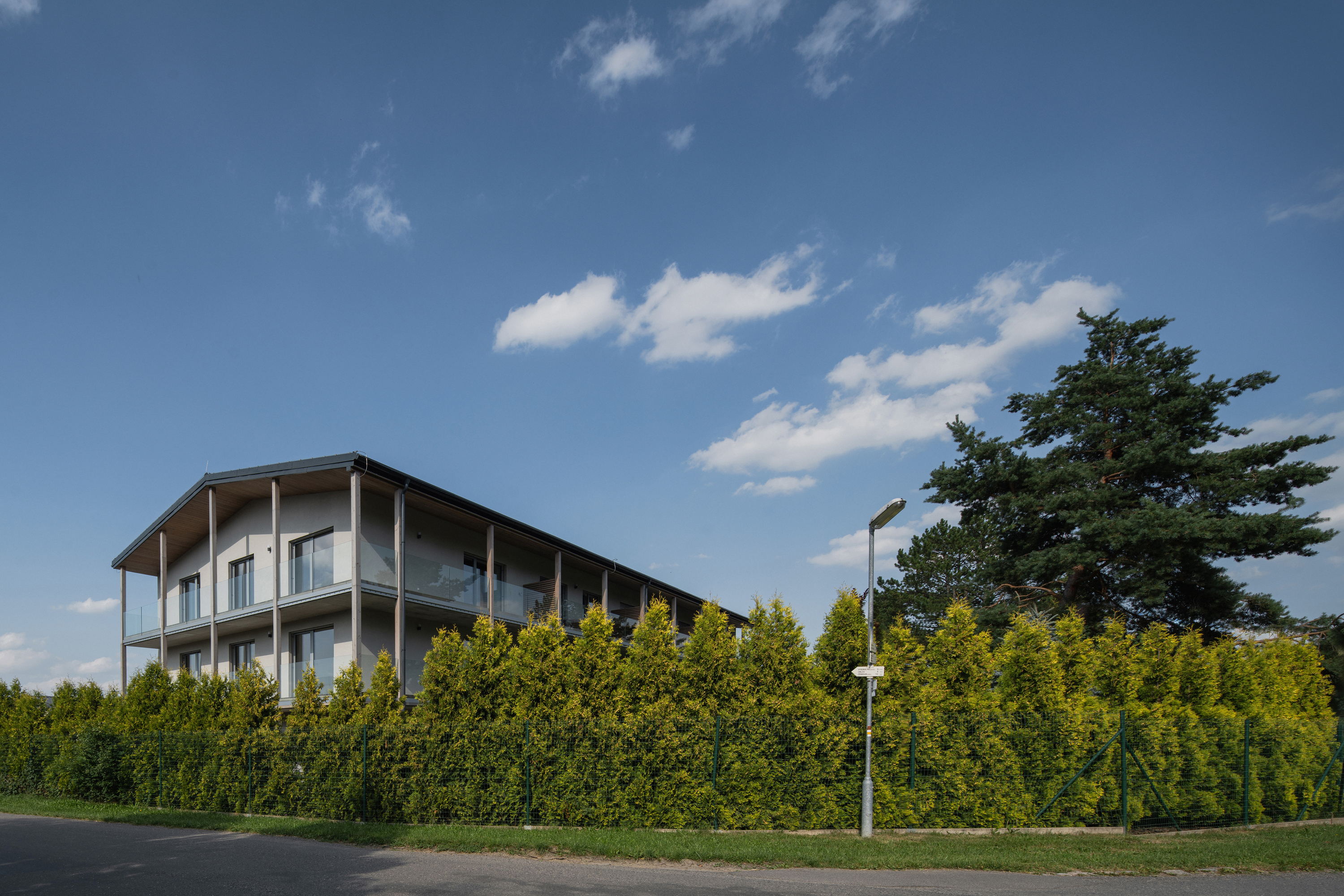Apartment Building at the Foot of the Hill by Karnet architekti ...