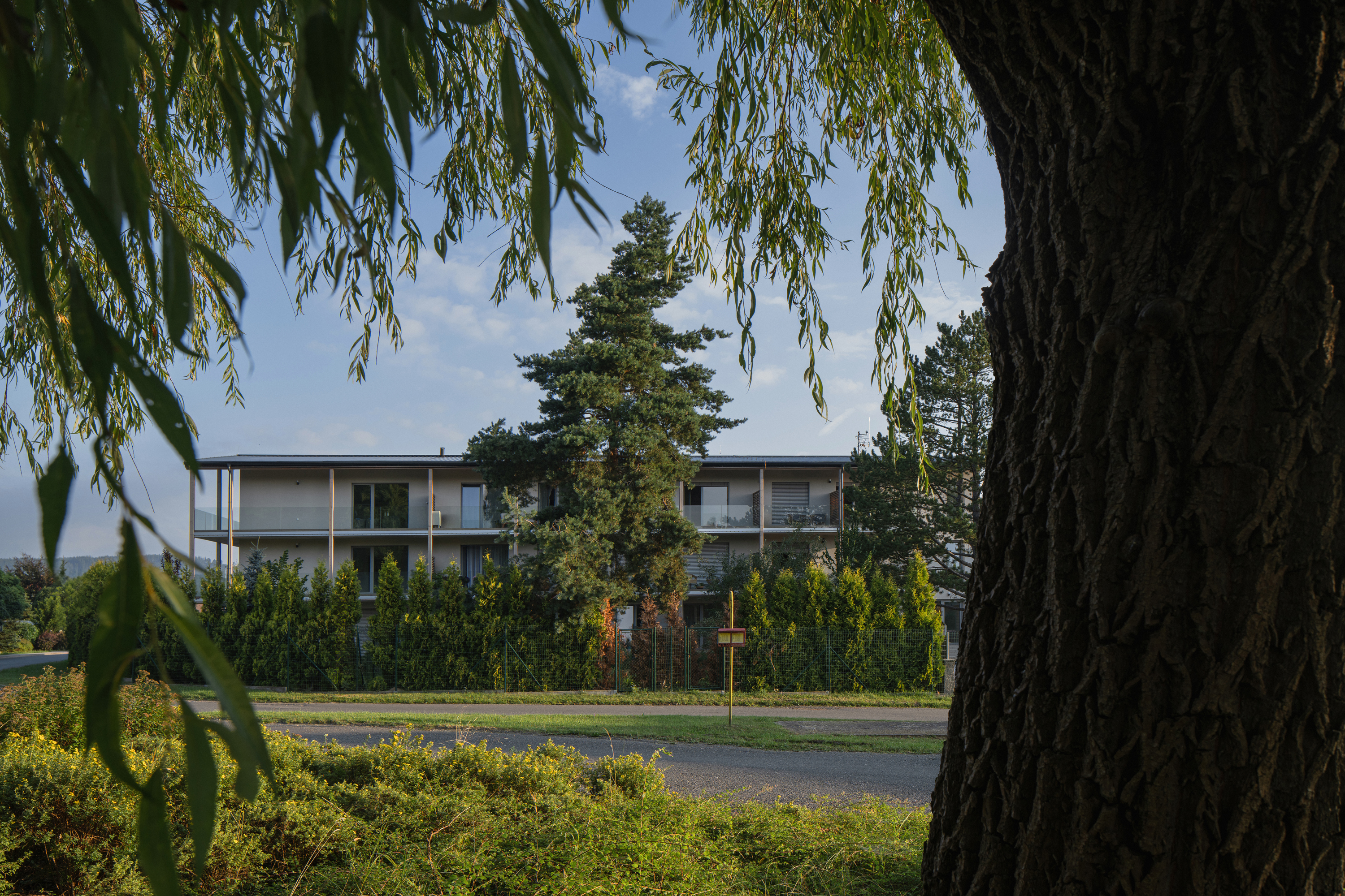 Apartment Building at the Foot of the Hill by Karnet architekti ...