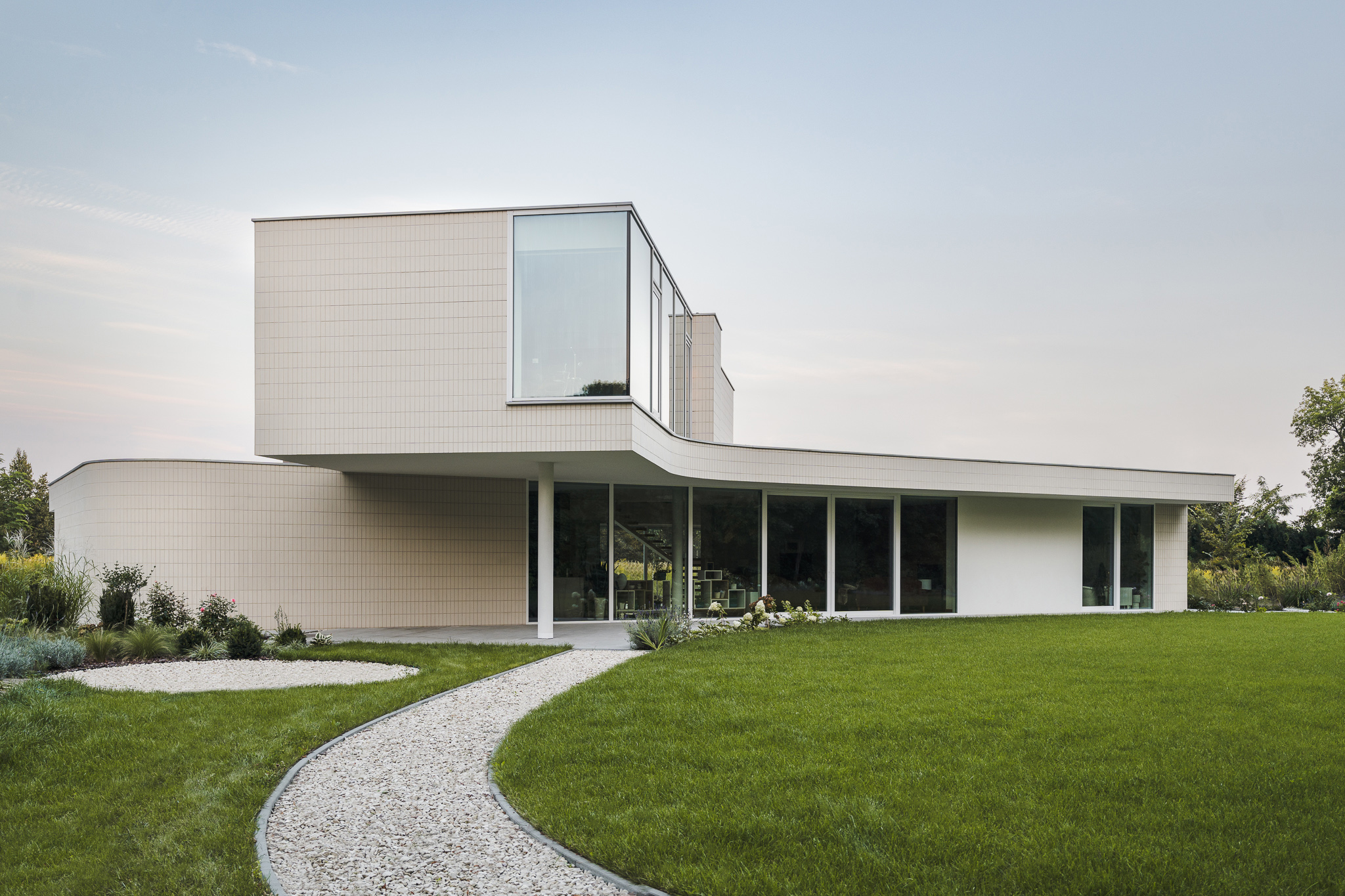 SWOOSH HOUSE by pawel lis architekci - Architizer