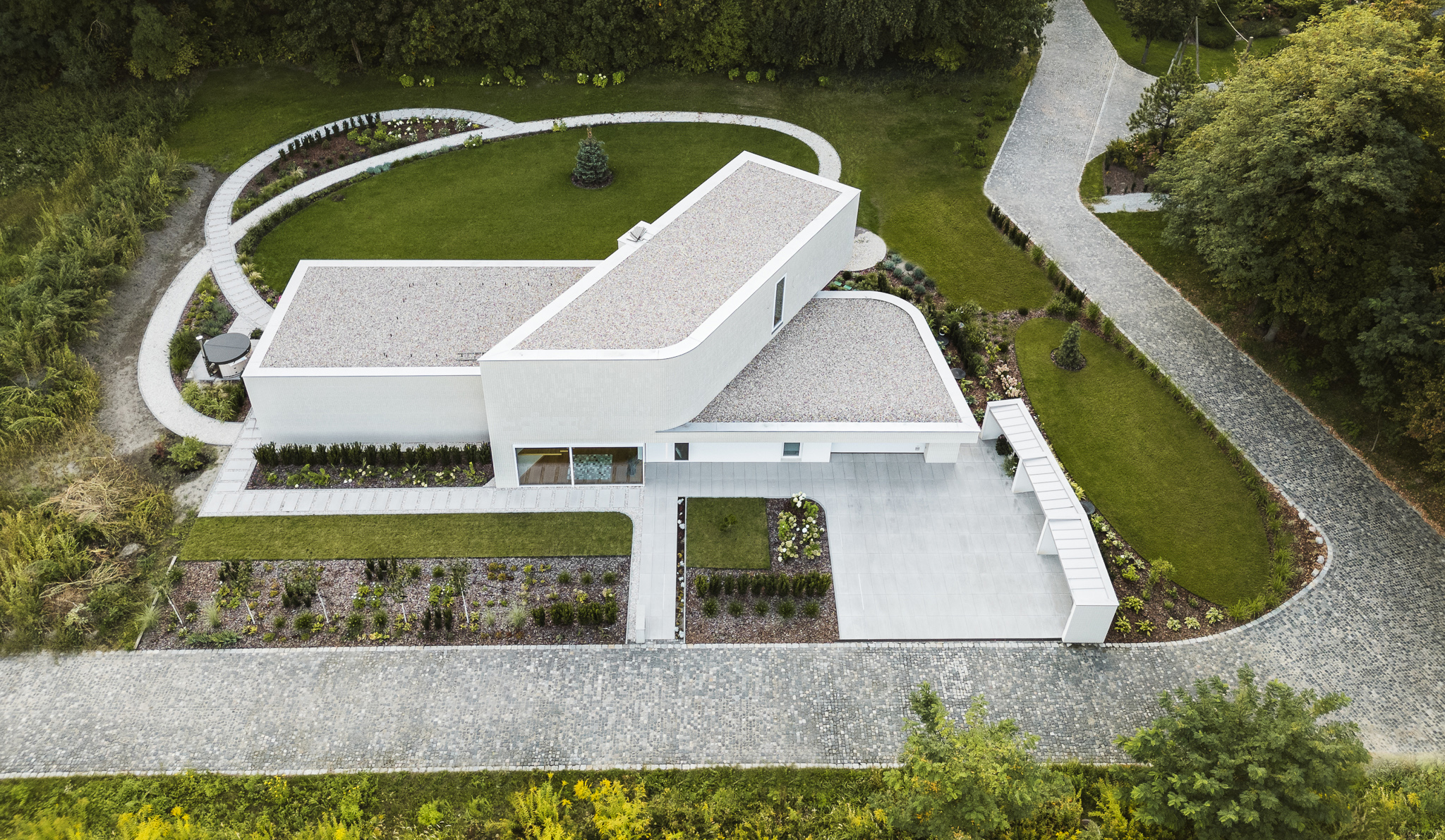 SWOOSH HOUSE by pawel lis architekci - Architizer