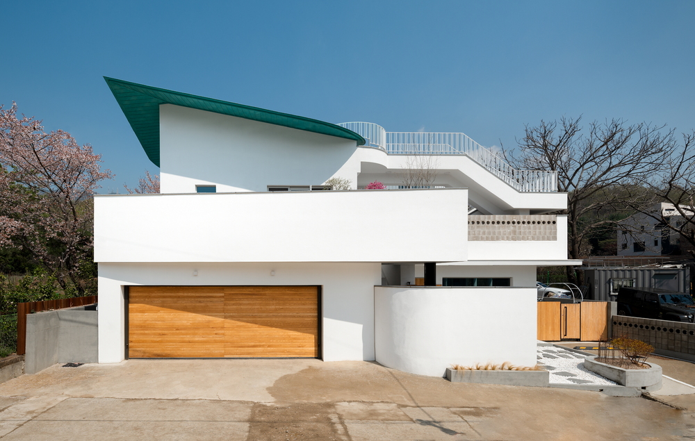 House with Interlaced Stairs by Studio Gaon - Architizer