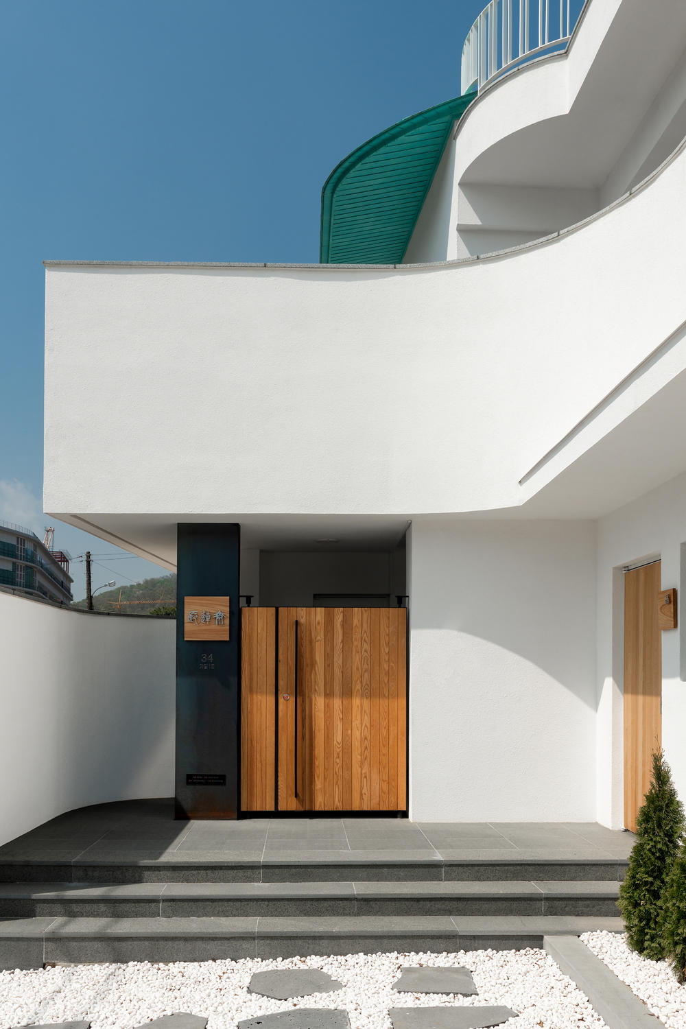 House with Interlaced Stairs by Studio Gaon - Architizer