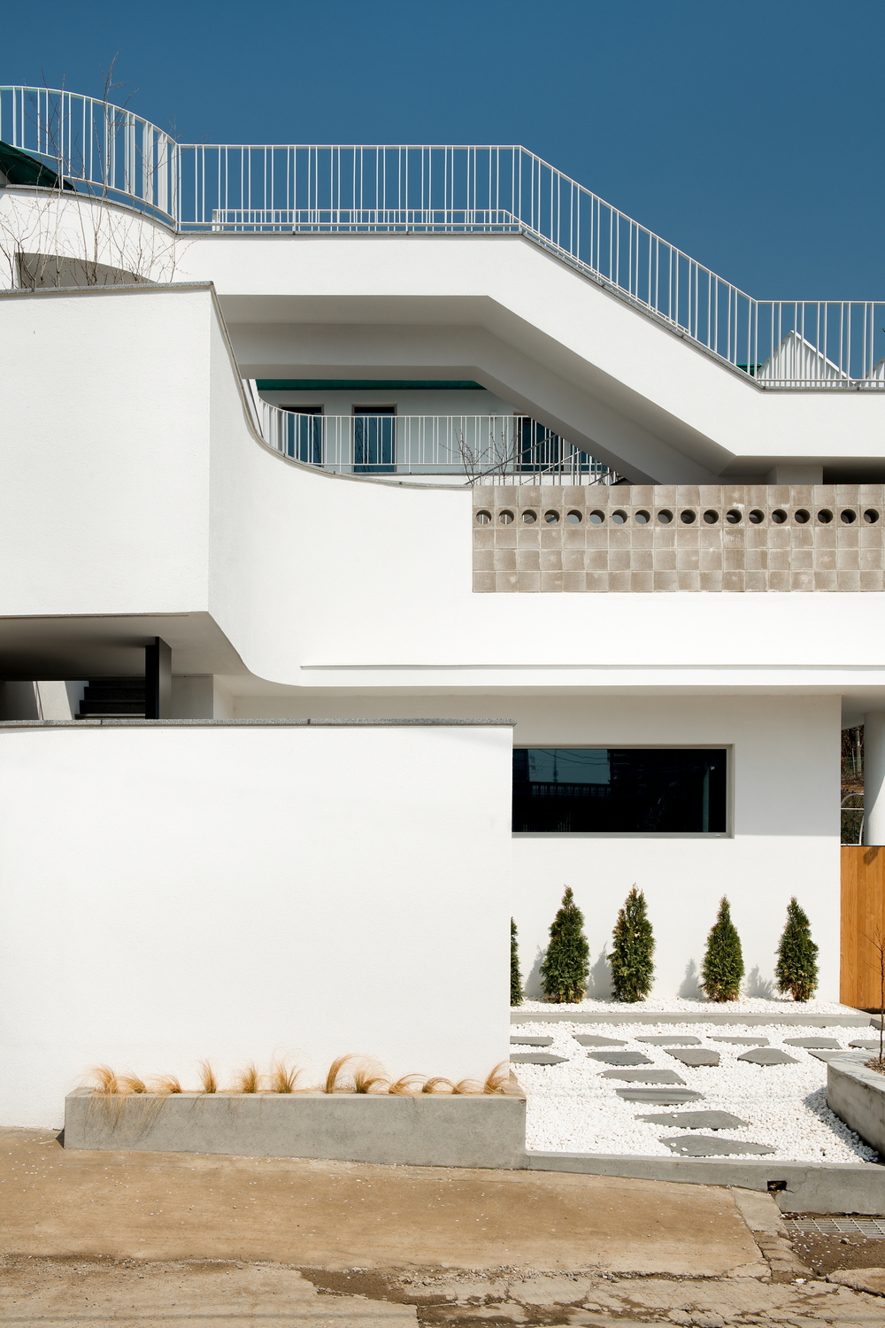 House with Interlaced Stairs by Studio Gaon - Architizer
