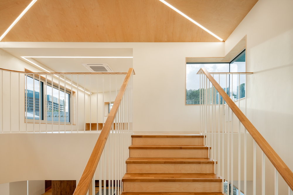 House with Interlaced Stairs by Studio Gaon - Architizer