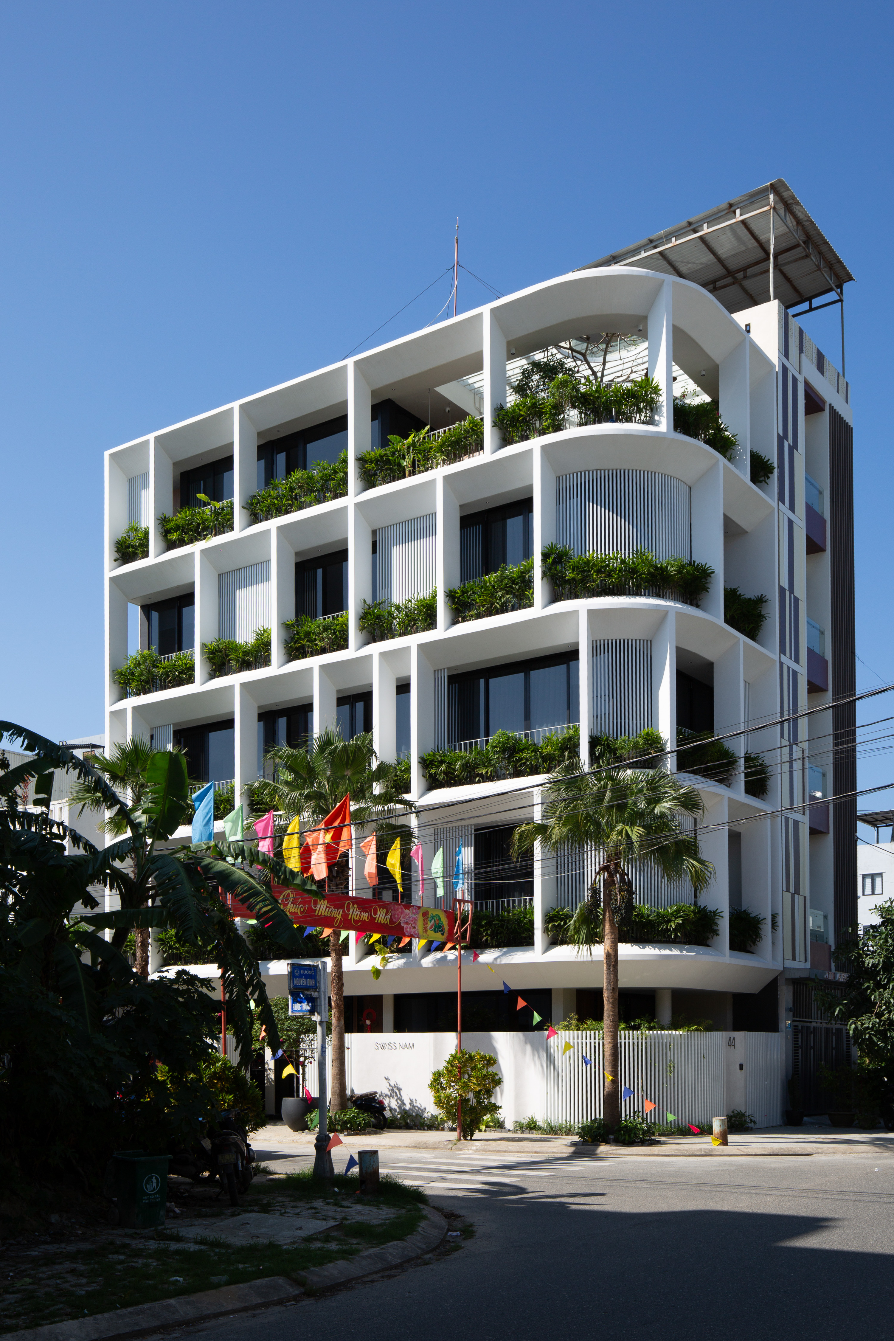 Swiss Nam Vertical Villa by AM Architects - Architizer