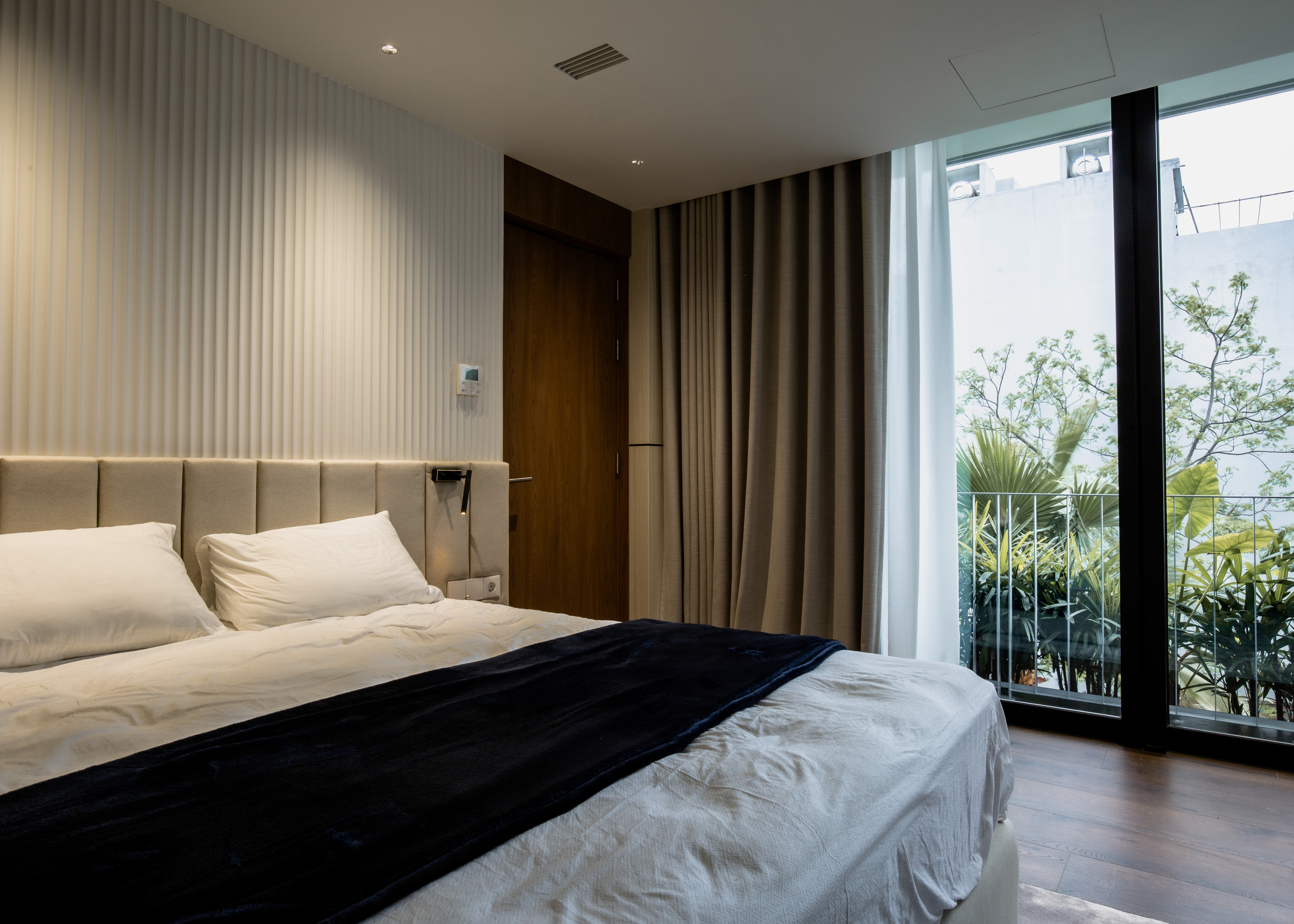 Swiss Nam Vertical Villa by AM Architects - Architizer