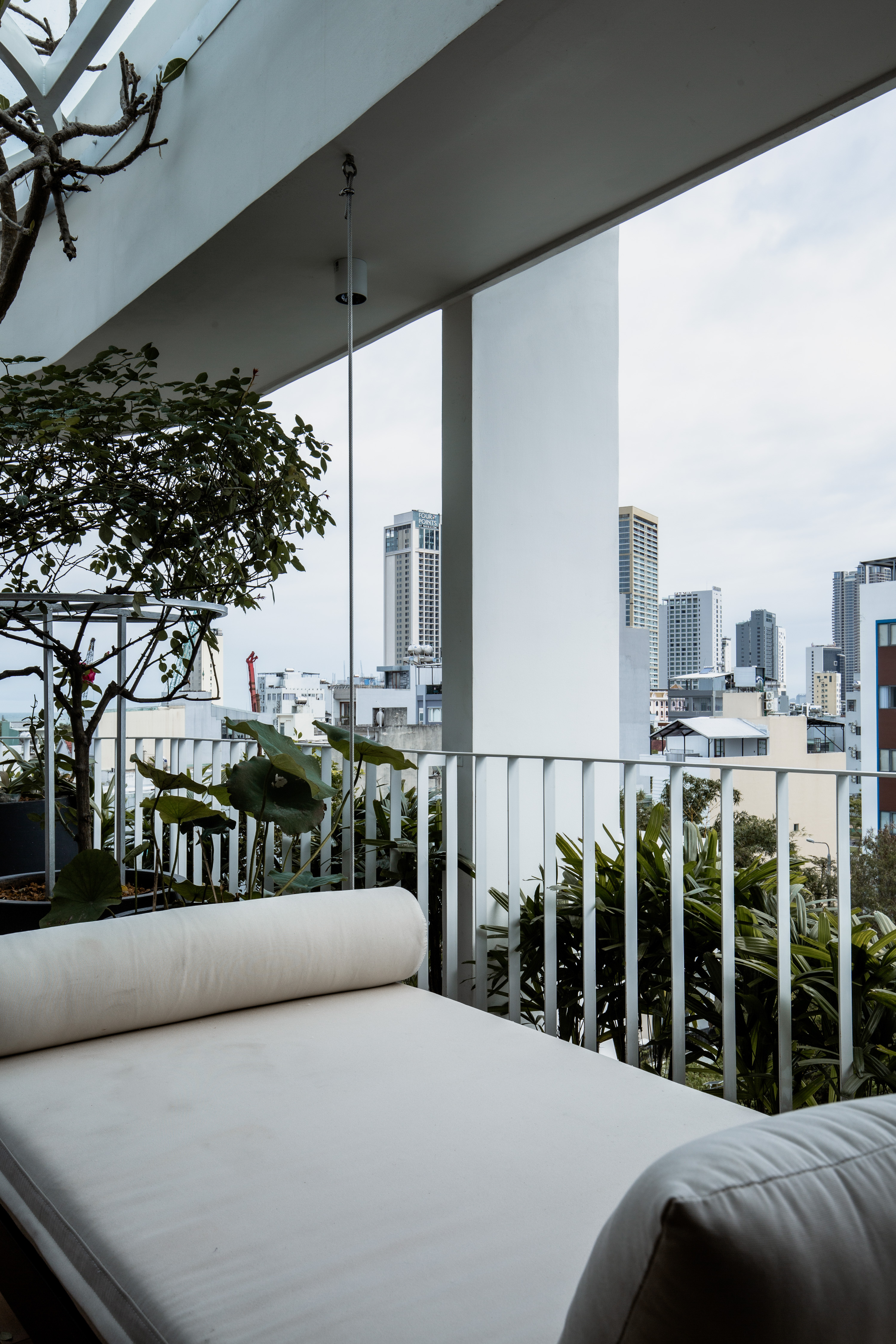 Swiss Nam Vertical Villa by AM Architects - Architizer