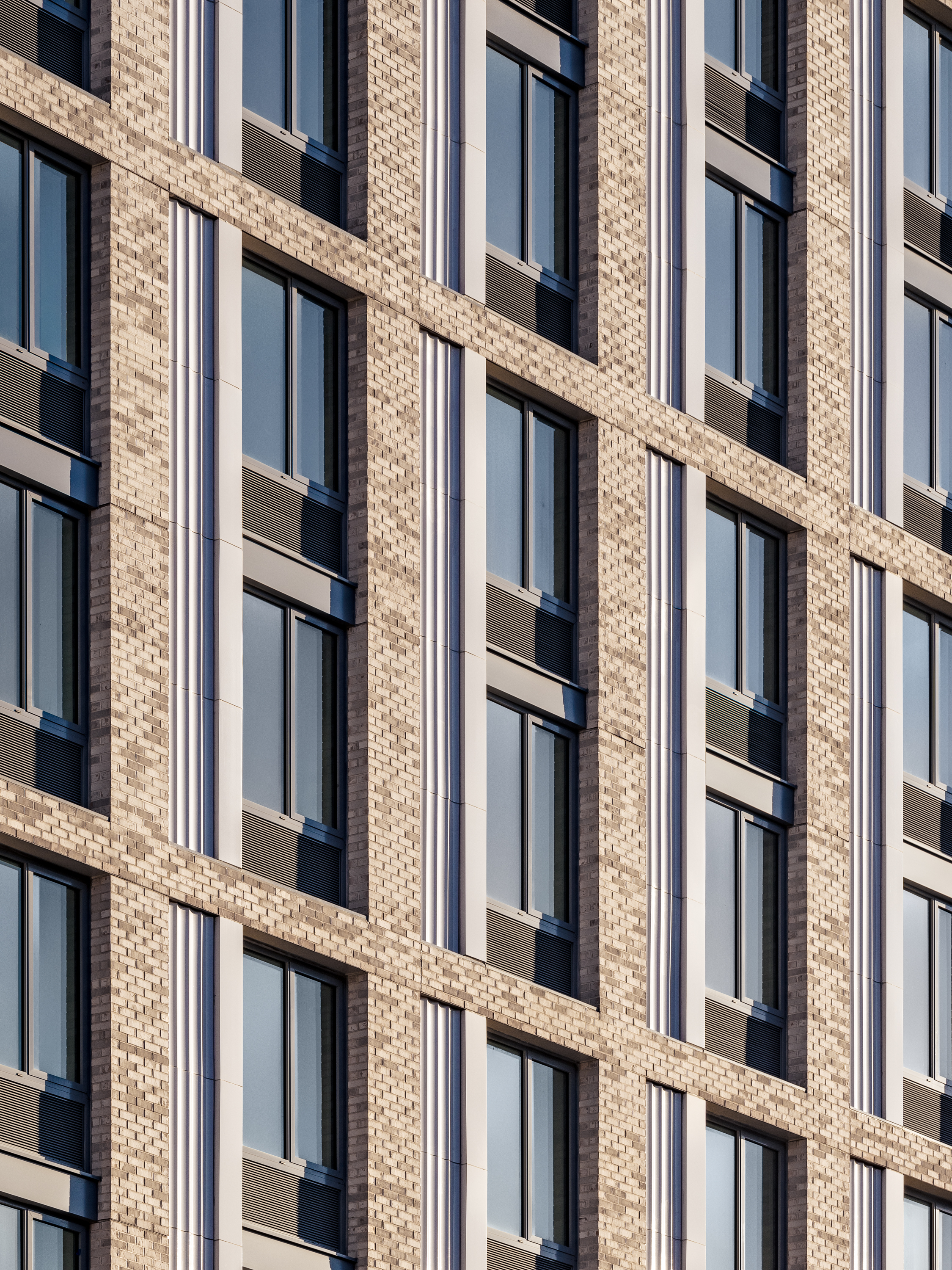 The Eliza Apartments + Inwood Library by Fogarty Finger - Architizer