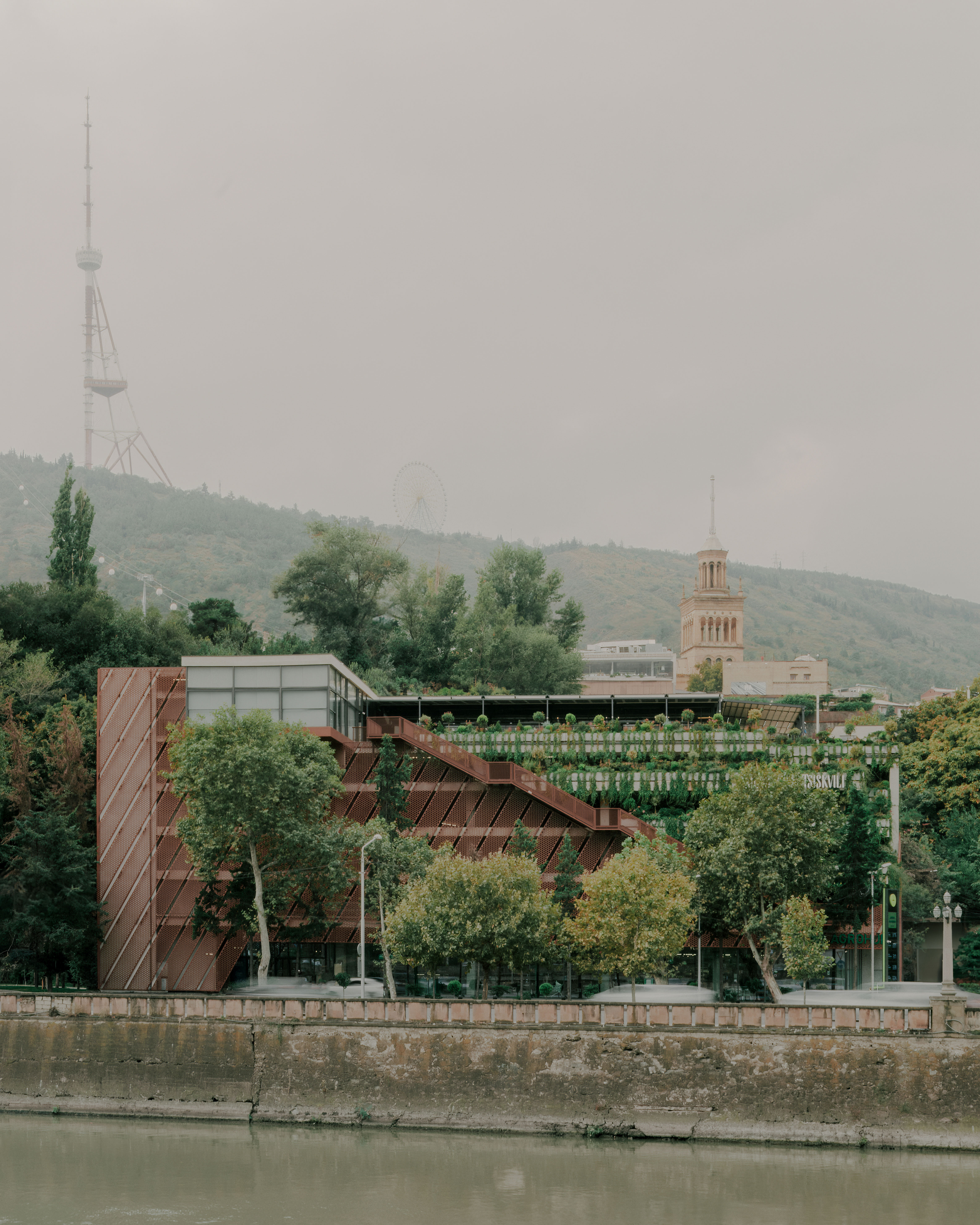 Multifunctional Landmark on the Riverbank by STUDIO 9 - Architizer