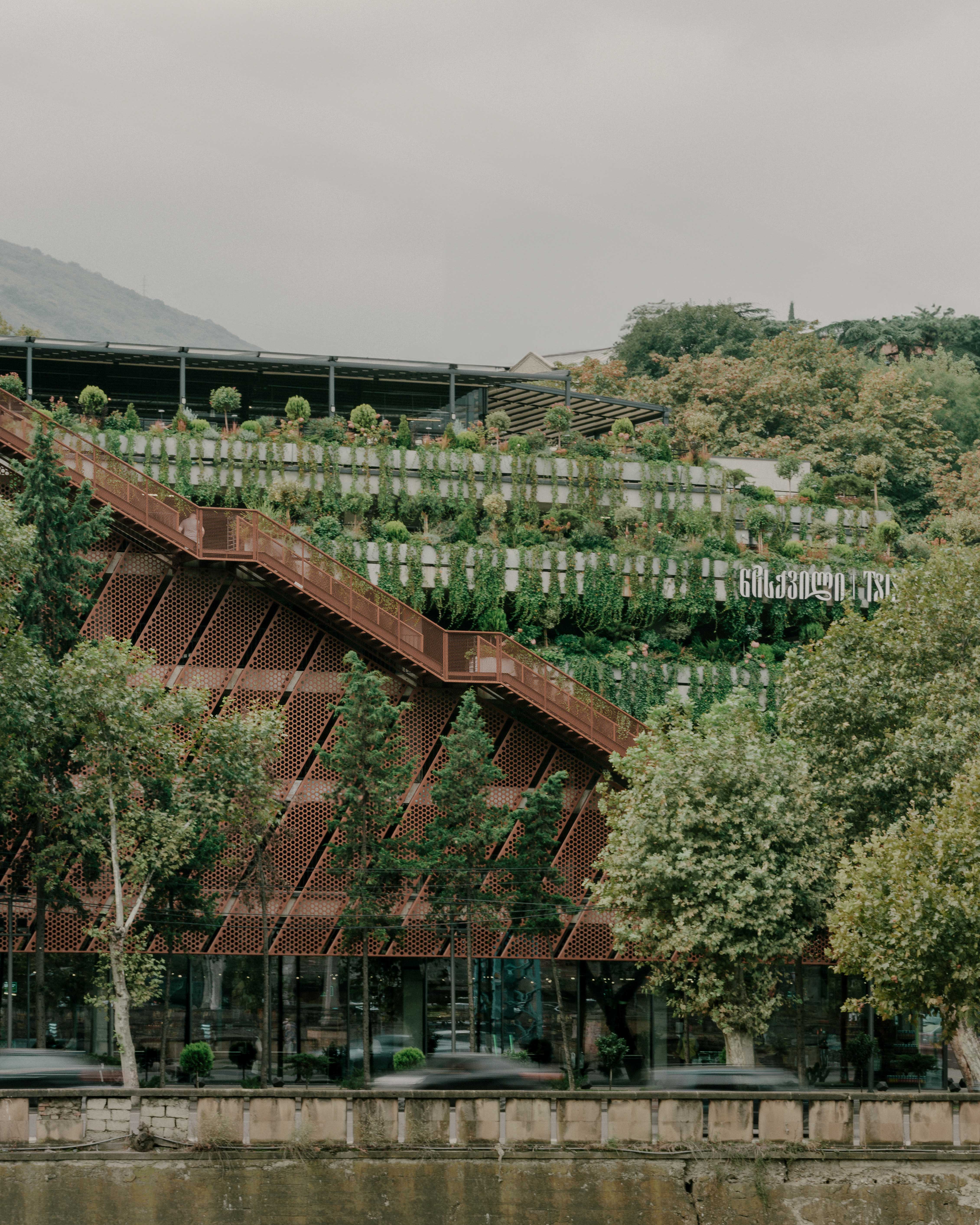 Multifunctional Landmark on the Riverbank by STUDIO 9 - Architizer
