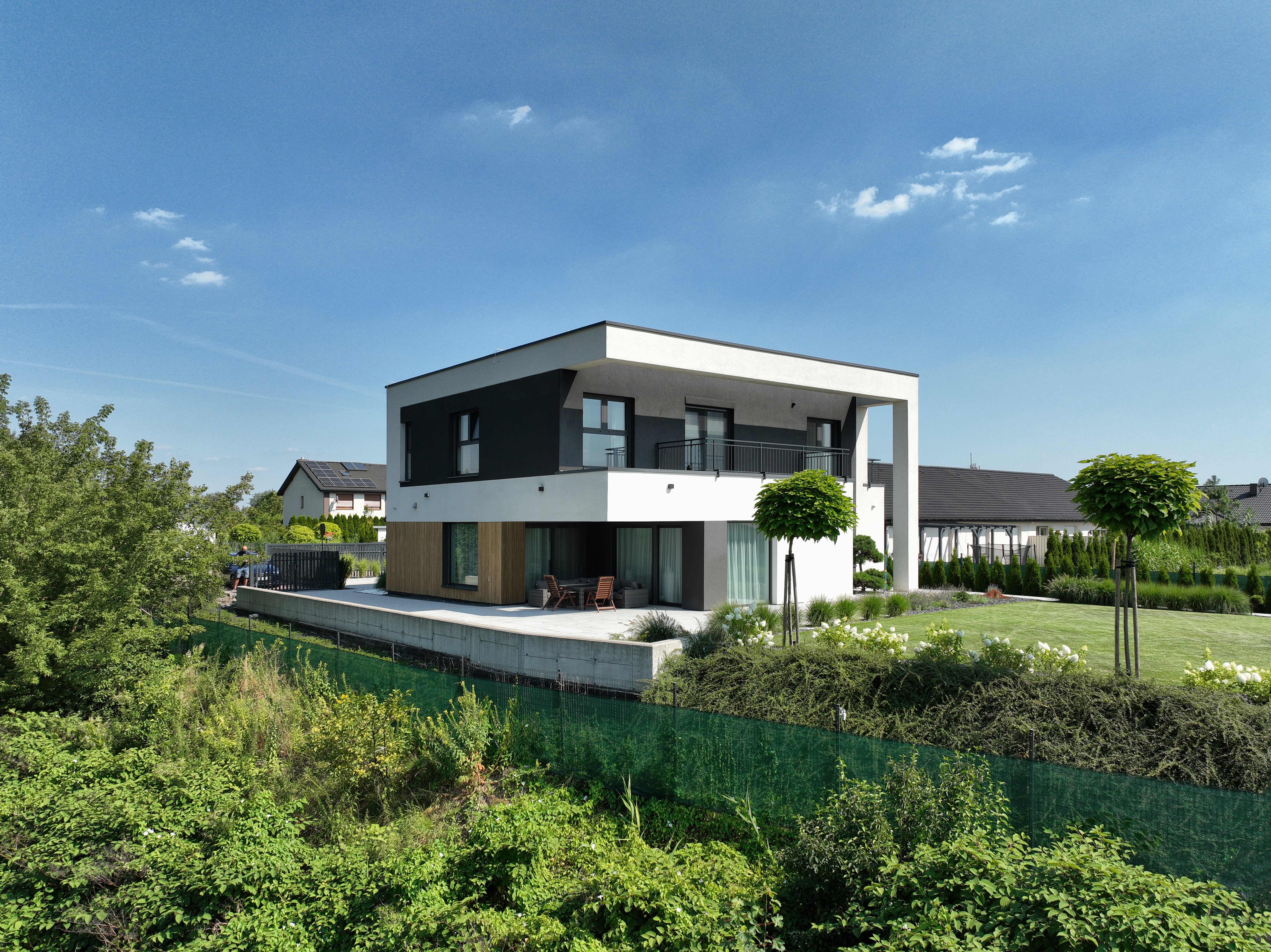 cube house on a slope by RESE Architekci - Architizer