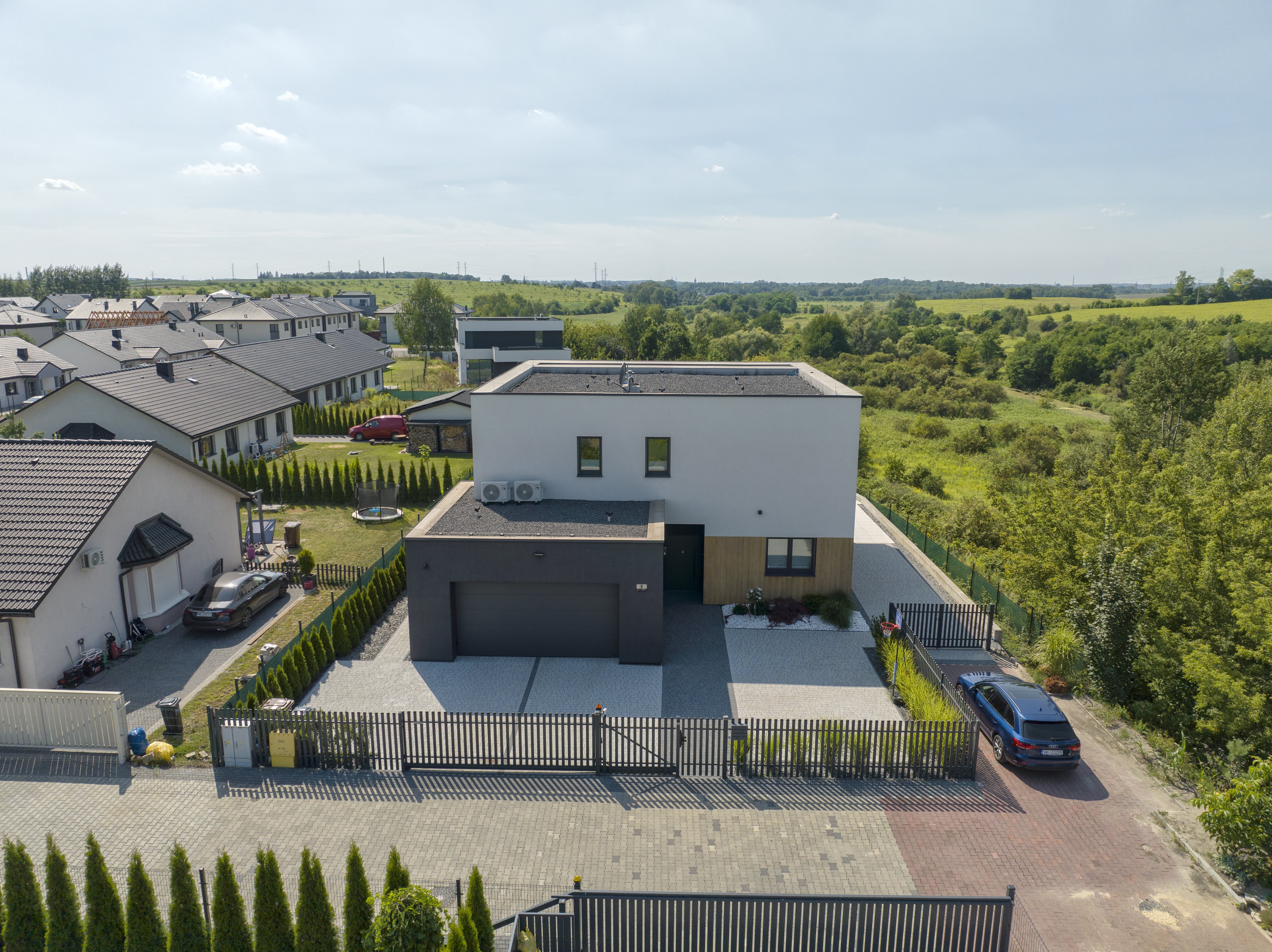 cube house on a slope by RESE Architekci - Architizer