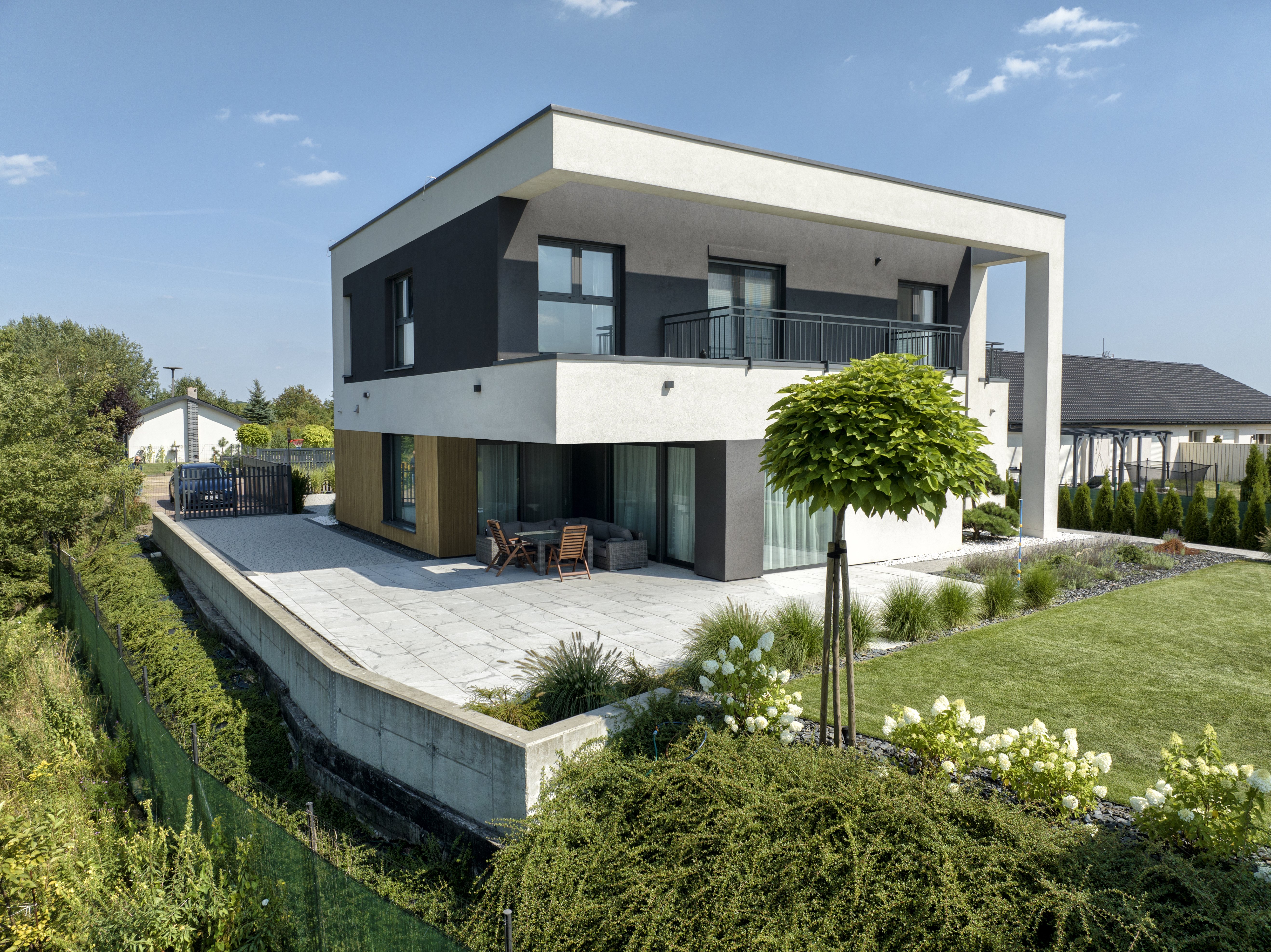 cube house on a slope by RESE Architekci - Architizer