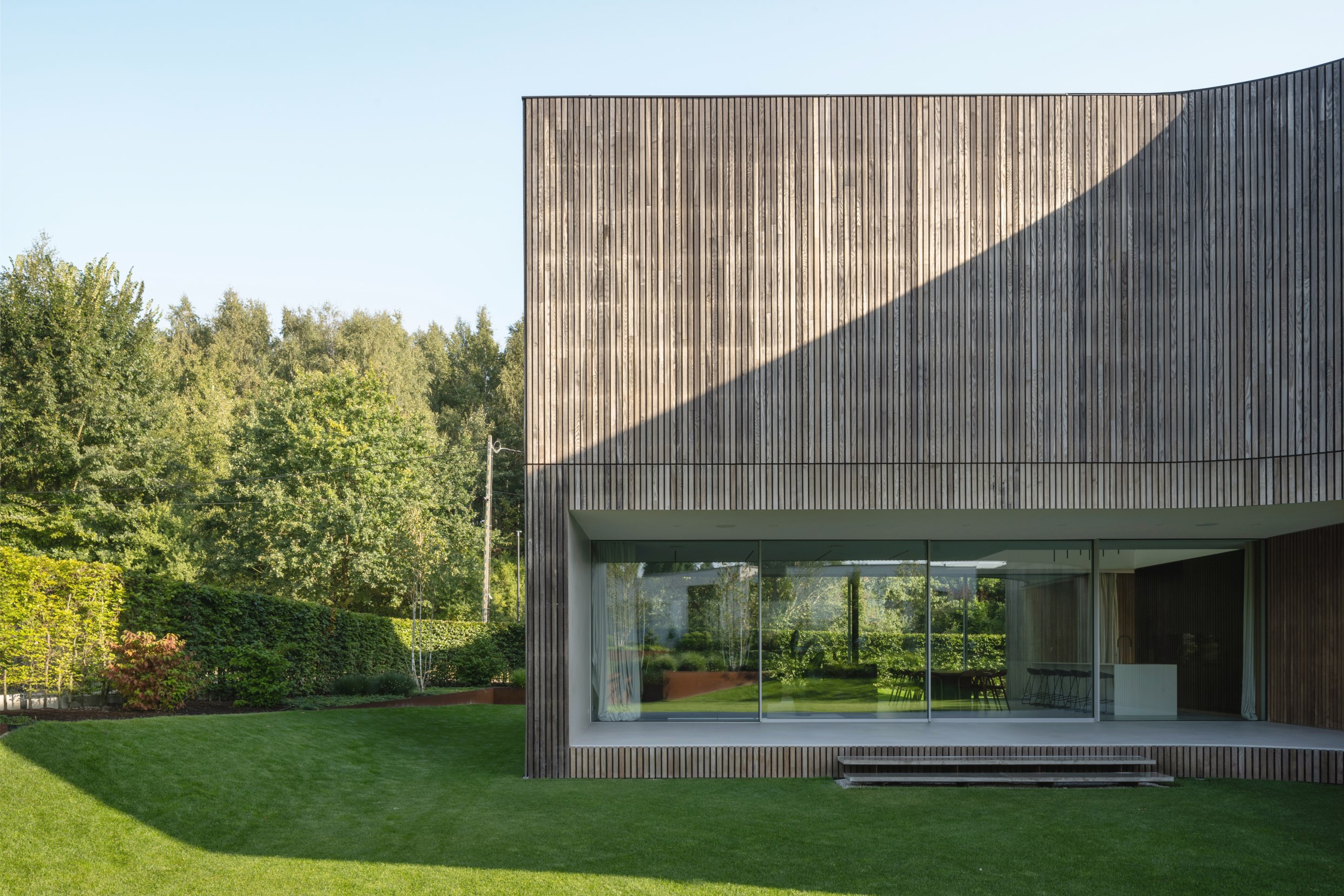 Two-sided House by TTAT - Architizer